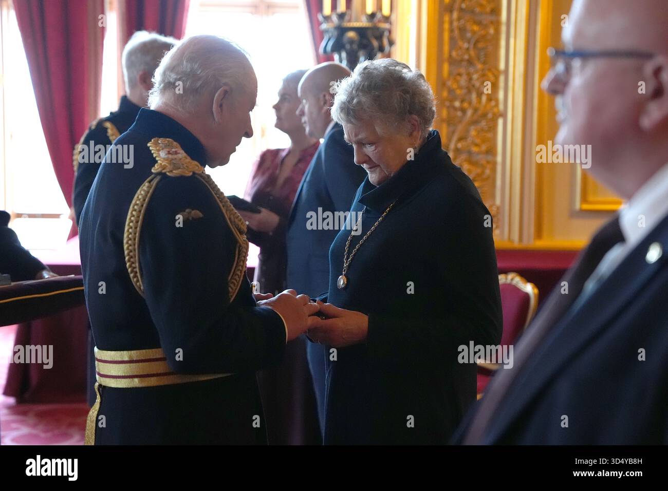 Mrs. Violet Craig (Widow) receives the Elizabeth Emblem from King ...