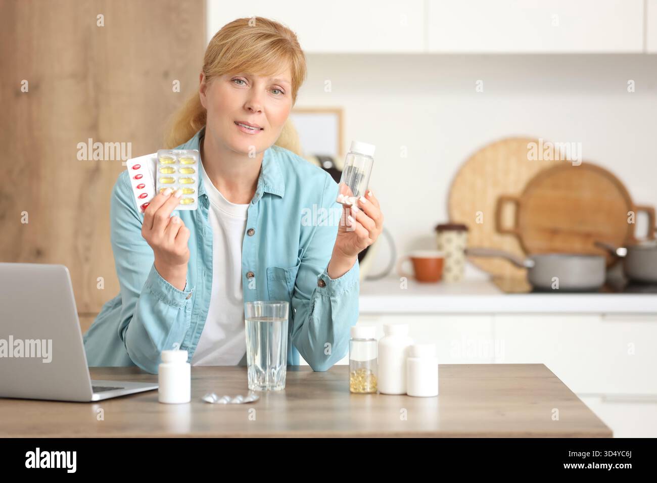 Mature woman different vitamin hi-res stock photography and images - Alamy