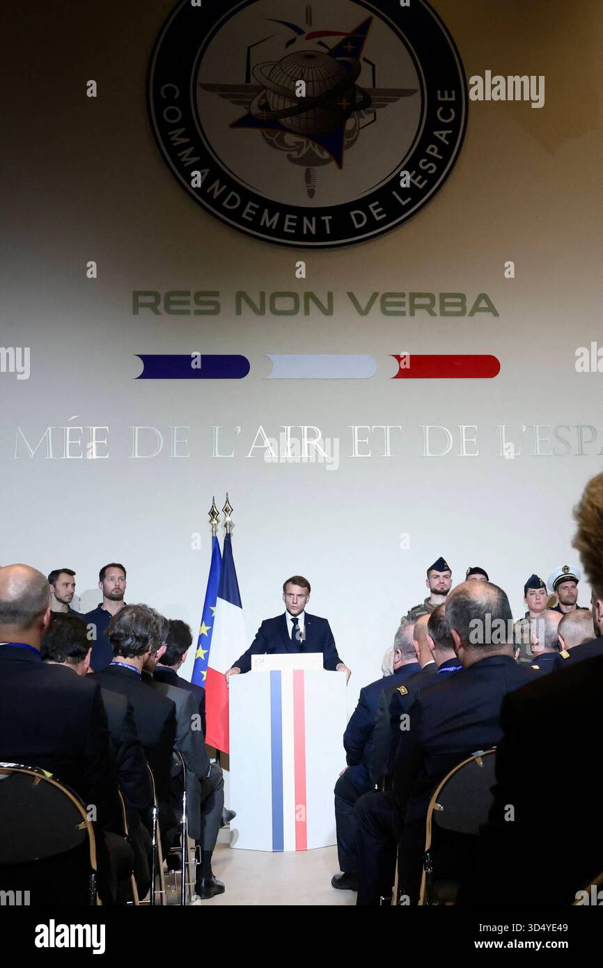 President Emmanuel Macron delivers a speech at Air Base 101, Space ...
