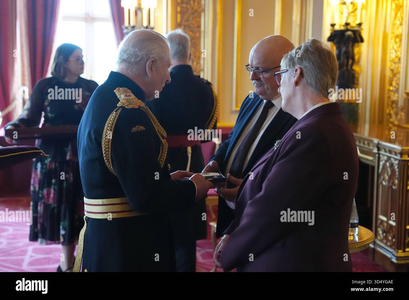 Mr. Eamonn McNulty (Brother) receives the Elizabeth Emblem from King ...