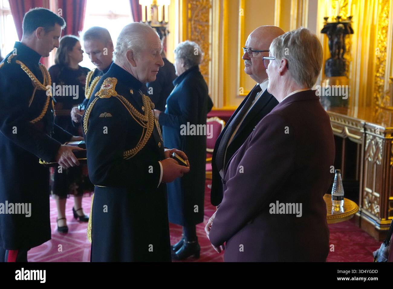 Mr. Eamonn McNulty (Brother) receives the Elizabeth Emblem from King ...