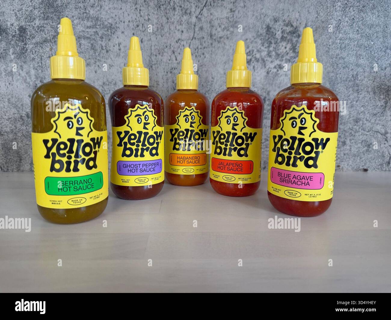 An assortment of Yellow Bird hot sauces are displayed in New York ...