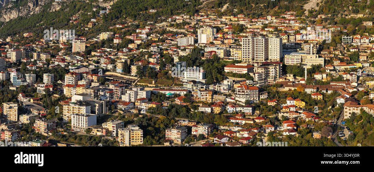Wide aerial panorama of Krujë city with its historic castle, modern ...