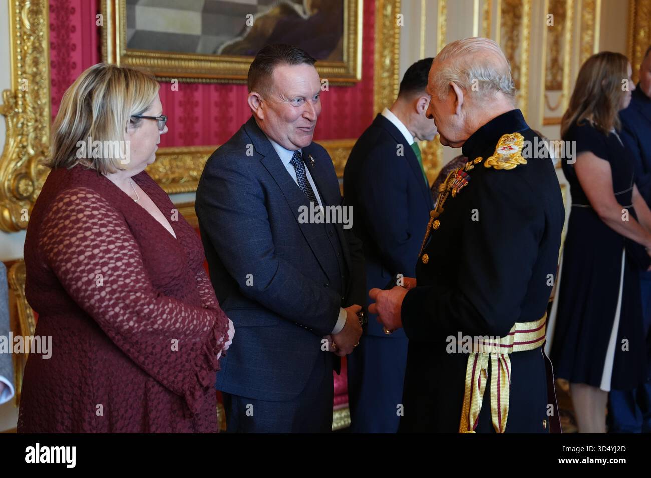 Mr. Nigel Lutton (Son) receives the Elizabeth Emblem from King Charles ...
