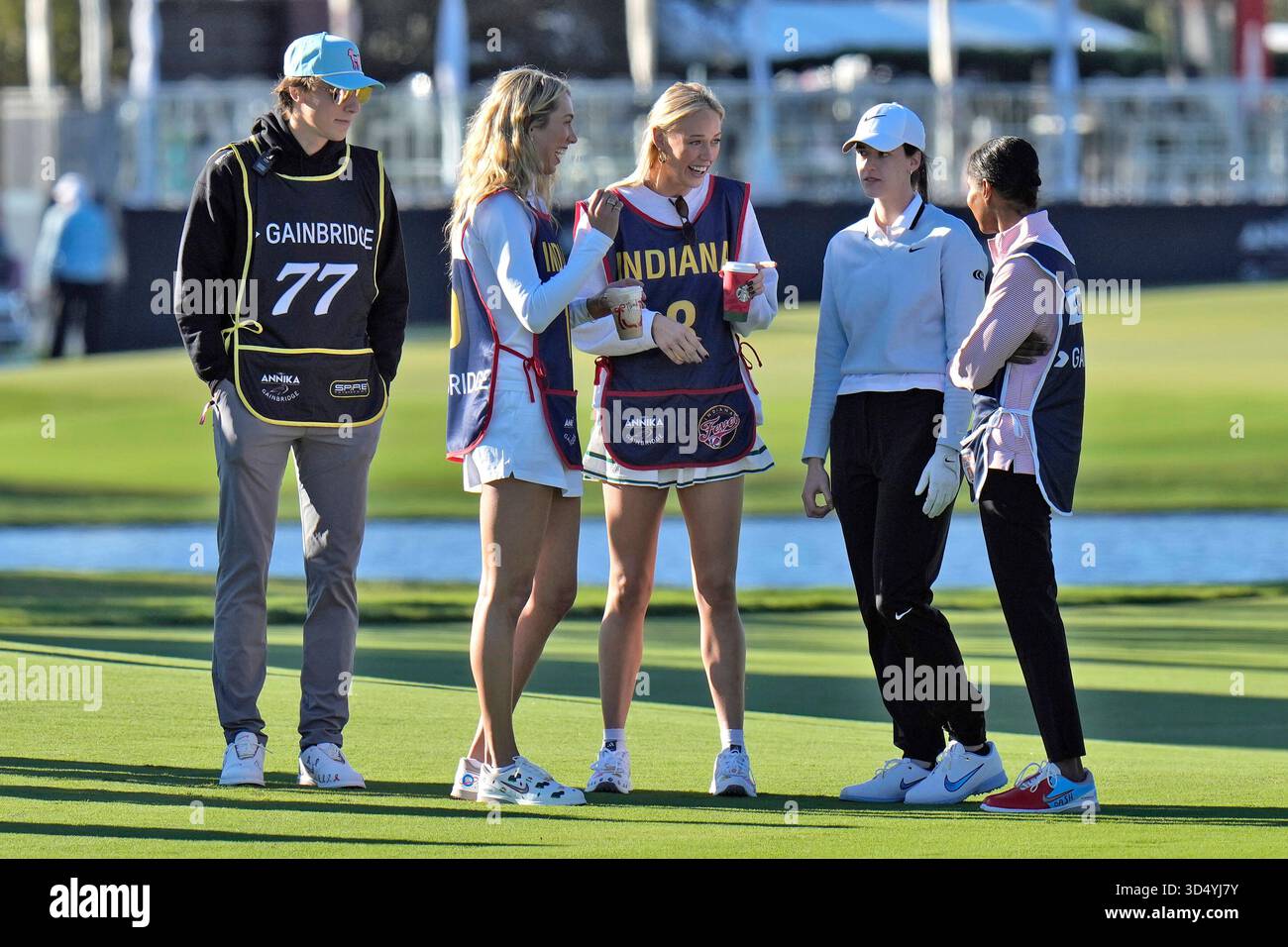 WNBA player Caitlin Clark, second from right, talks to celebrity ...