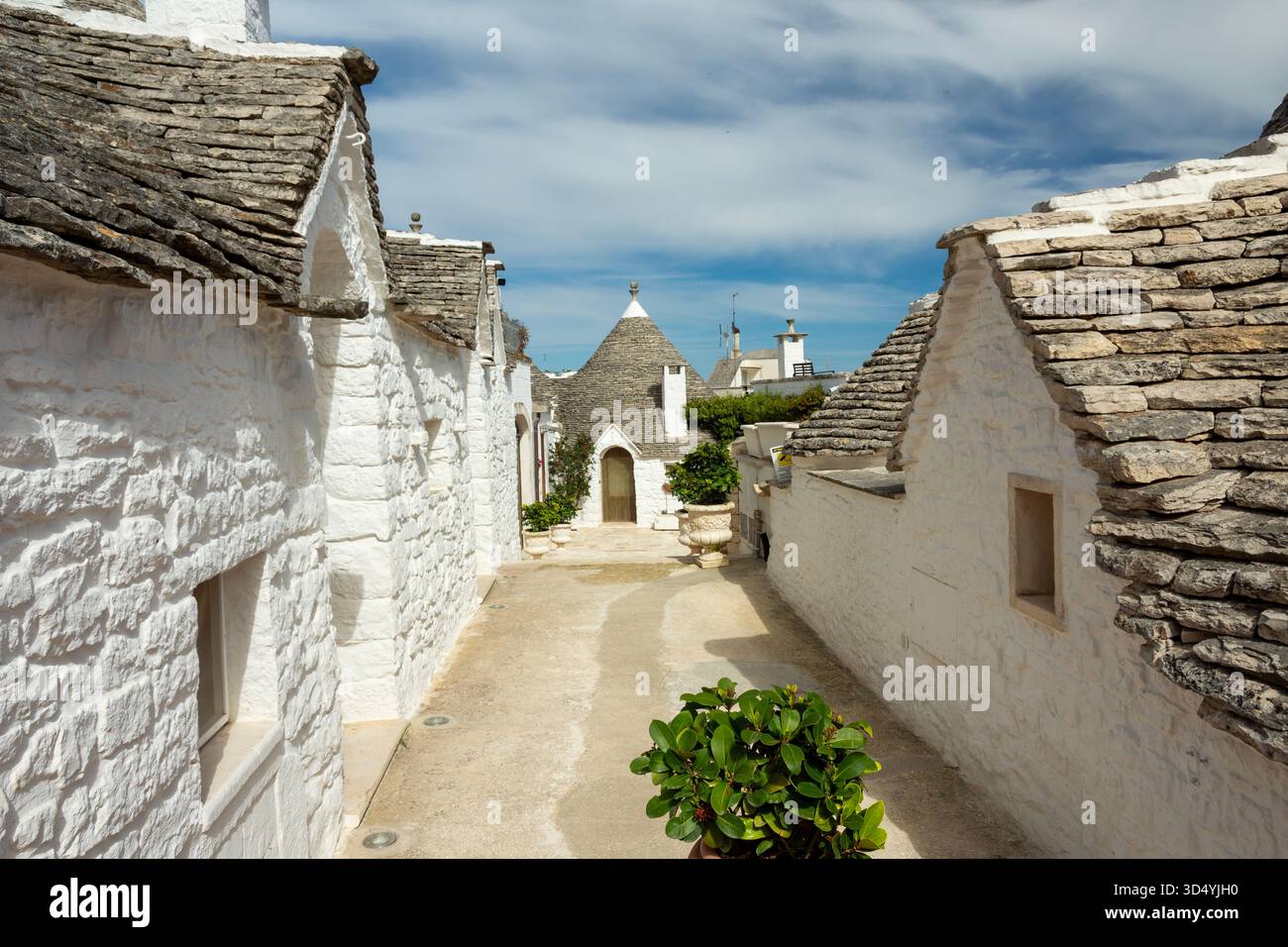 Trulli, traditional Apulian dry stone huts with conical roofs, in the ...