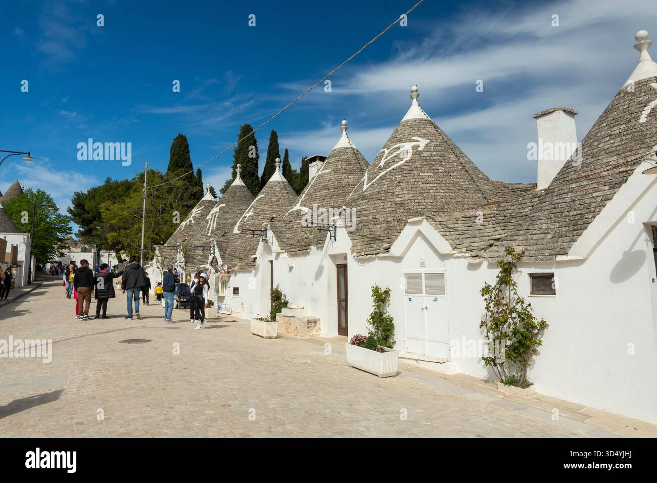 Trulli, traditional Apulian dry stone huts with conical roofs, in the ...