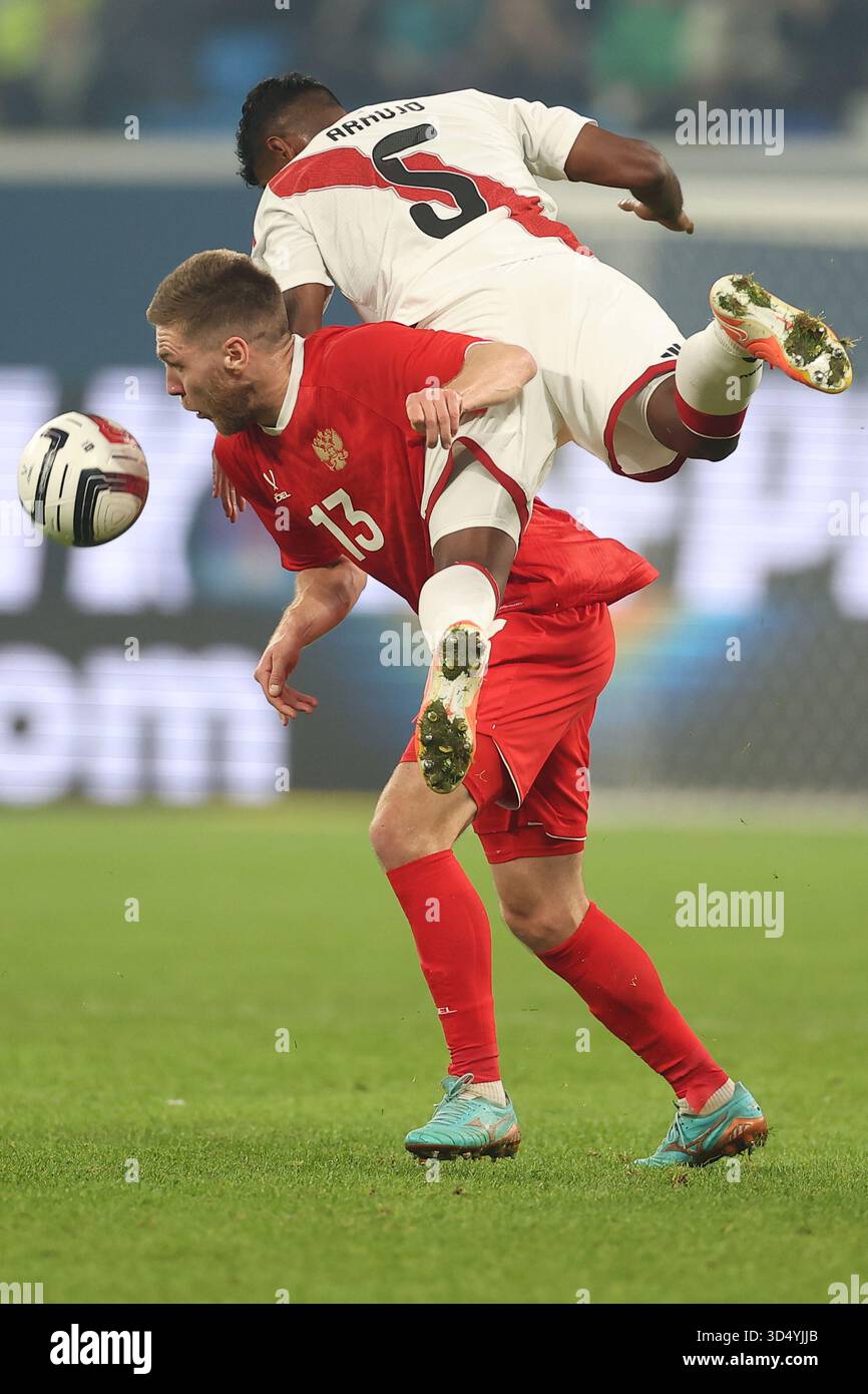 Russia's Ivan Sergeev, front, and Peru's Miguel Araujo fight for the ...