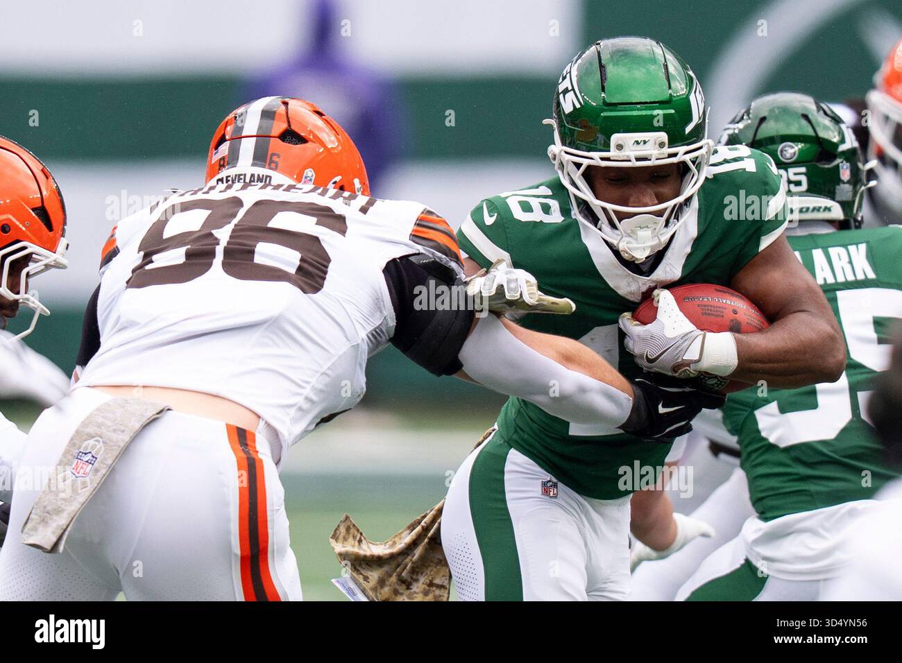 New York Jets wide receiver Isaiah Williams (18) retunes the kick ...