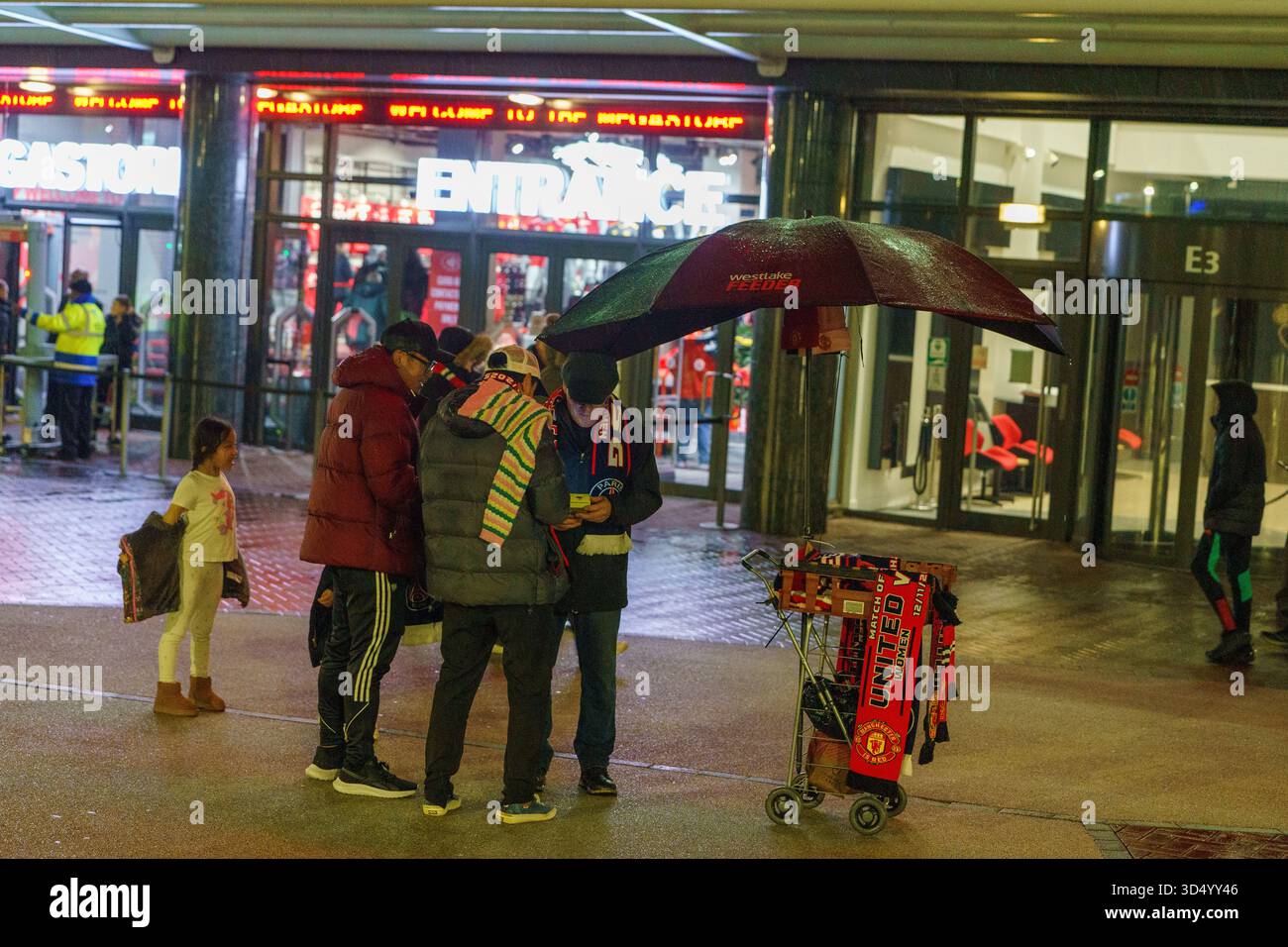 Manchester, UK, 12th Nov 2025: Manchester United fans arriving in the ...