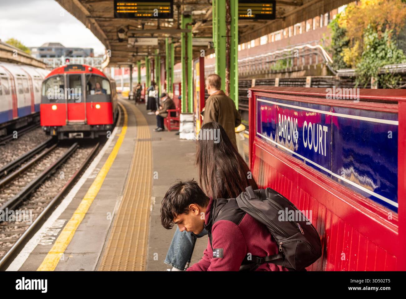 Commuters district line train hi-res stock photography and images - Alamy