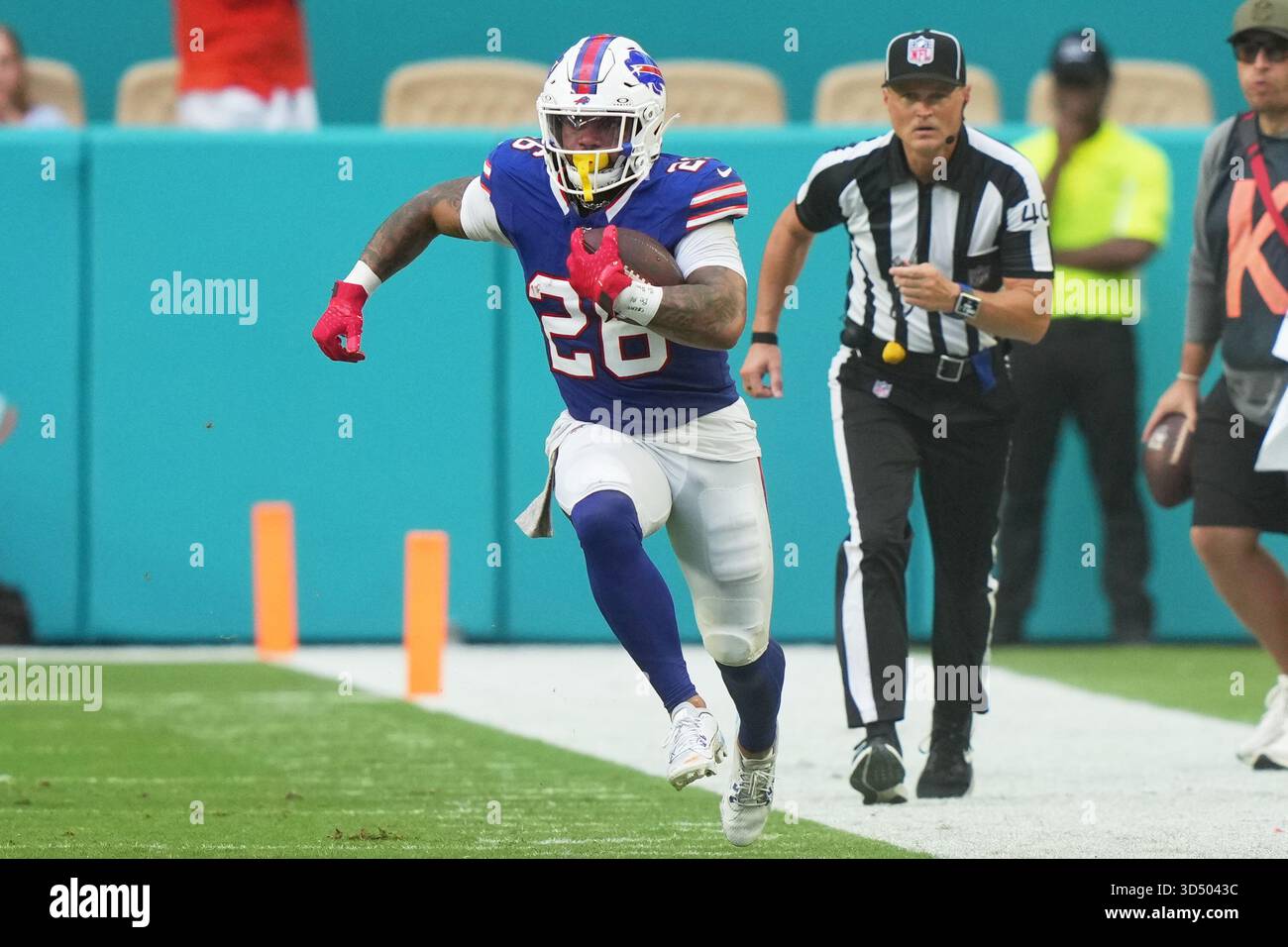 Buffalo Bills running back Ty Johnson (26) runs for a first down during ...
