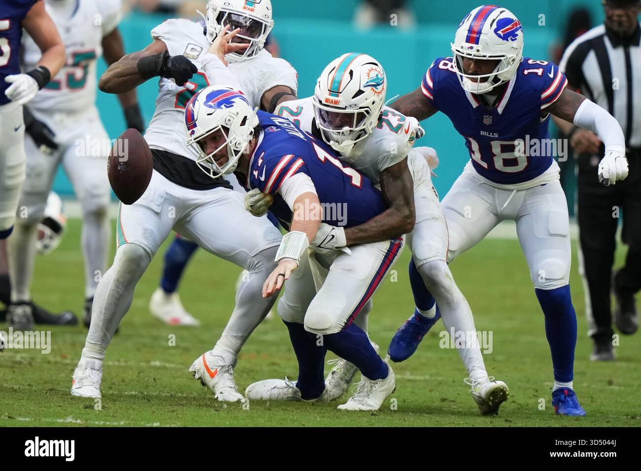Buffalo Bills quarterback Josh Allen (17) fumbles as Miami Dolphins ...