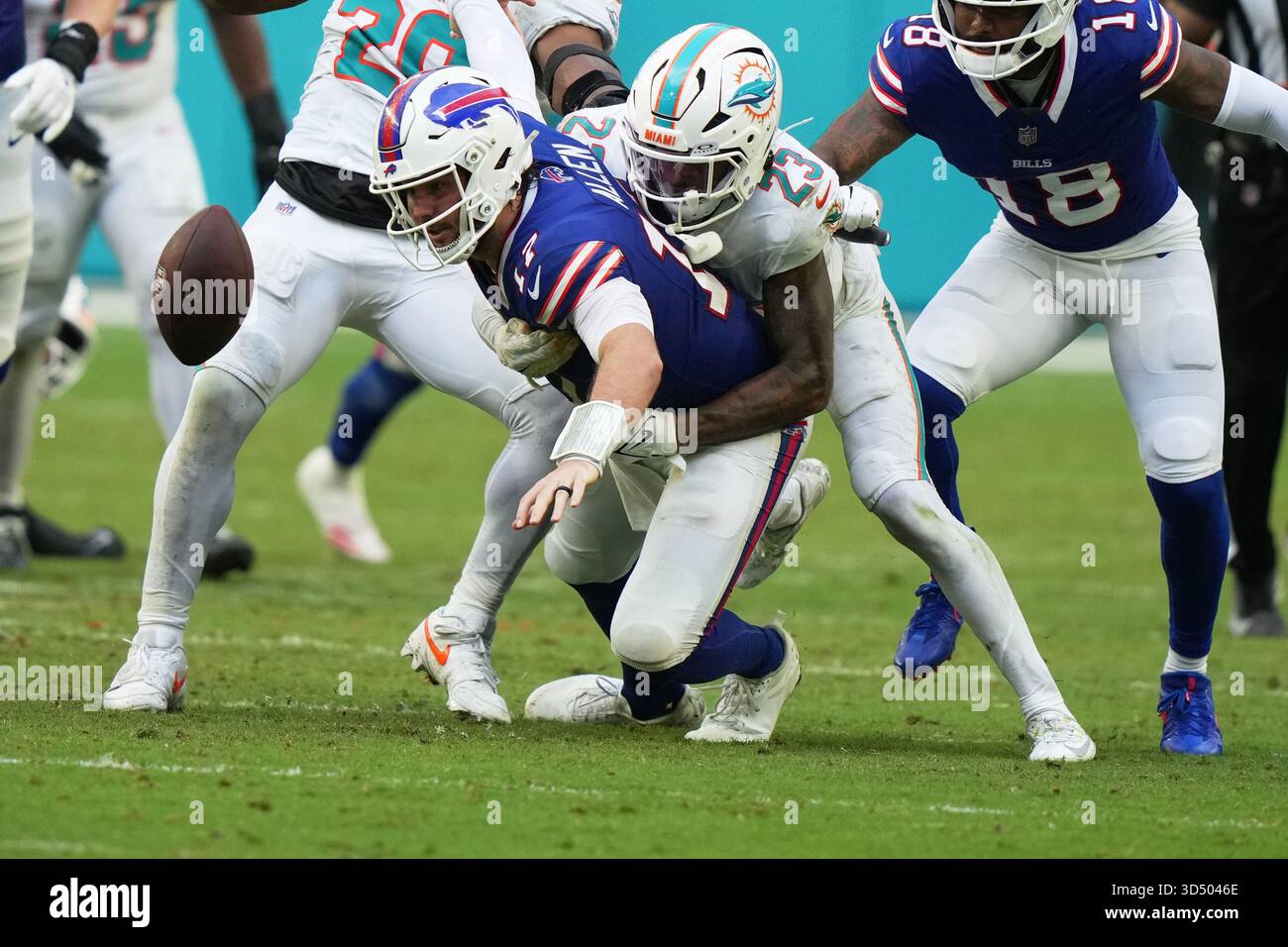 Buffalo Bills quarterback Josh Allen (17) fumbles as Miami Dolphins ...