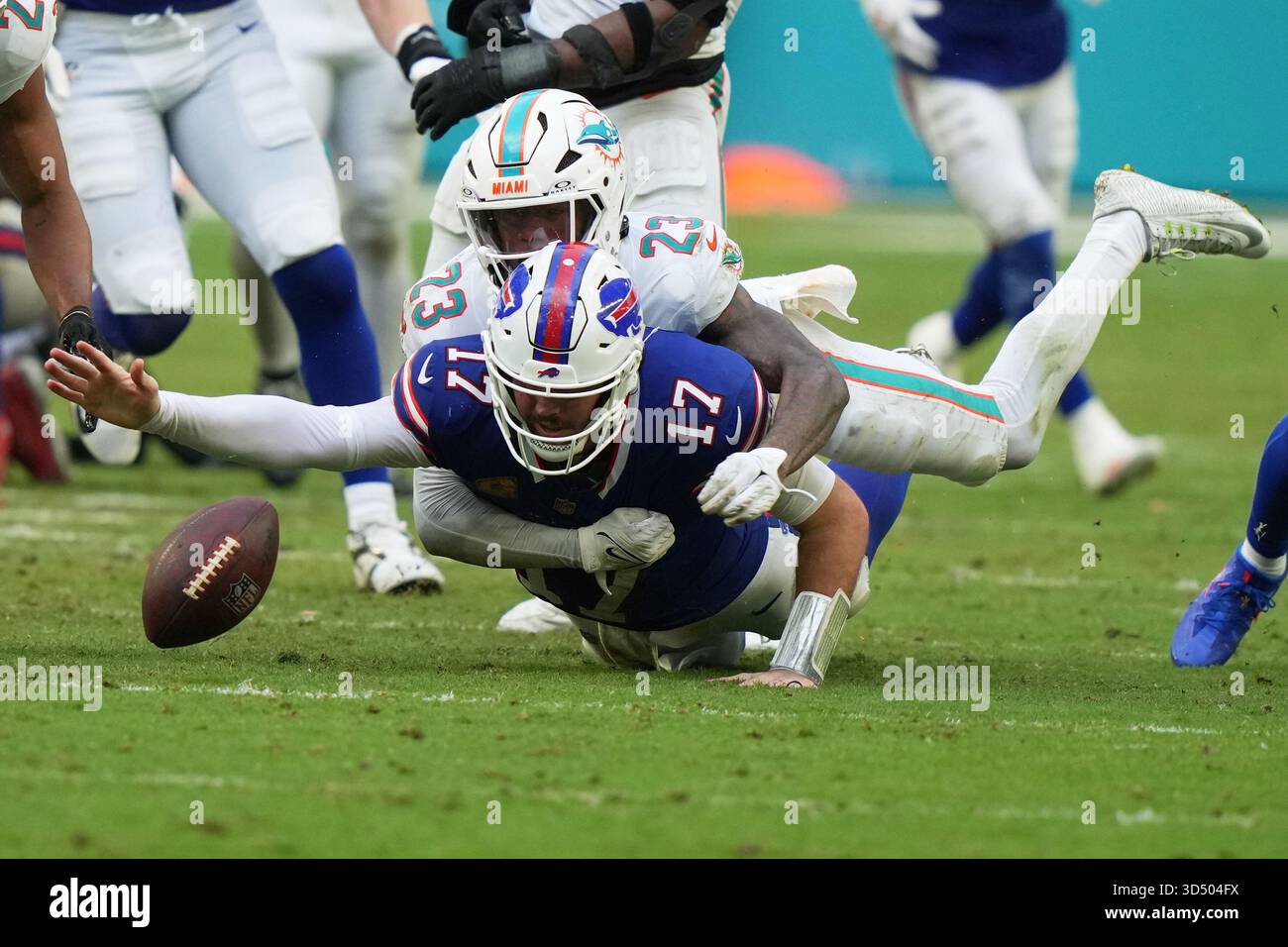 Buffalo Bills quarterback Josh Allen (17) fumbles as Miami Dolphins ...