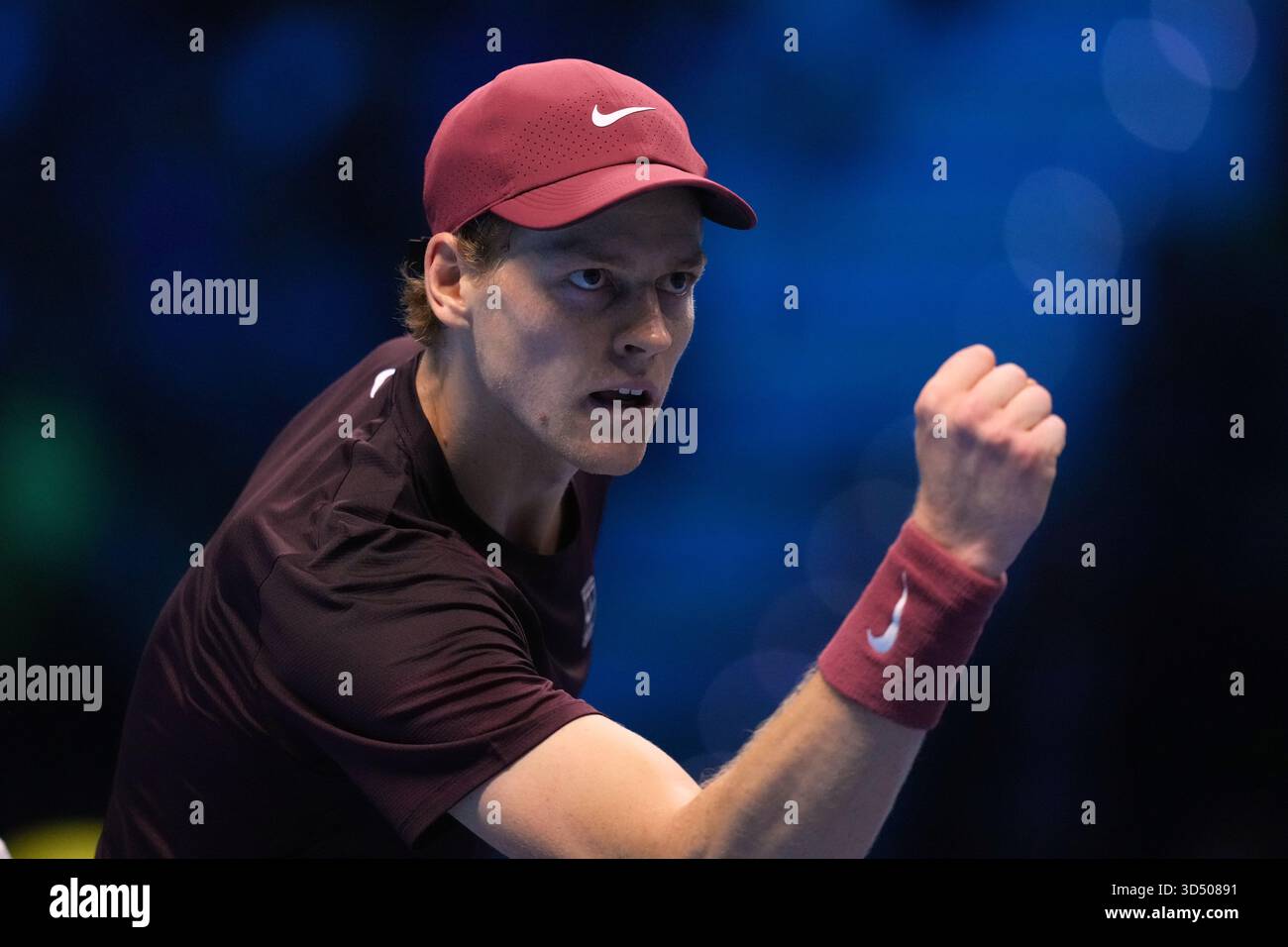 Italy's Jannik Sinner reacts after winning a point against Germany's Alexander Zverev during ...