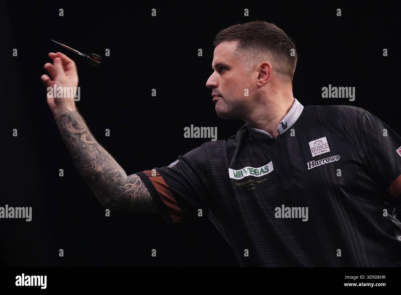 Luke Woodhouse during his second round match with Ricky Evans on day ...