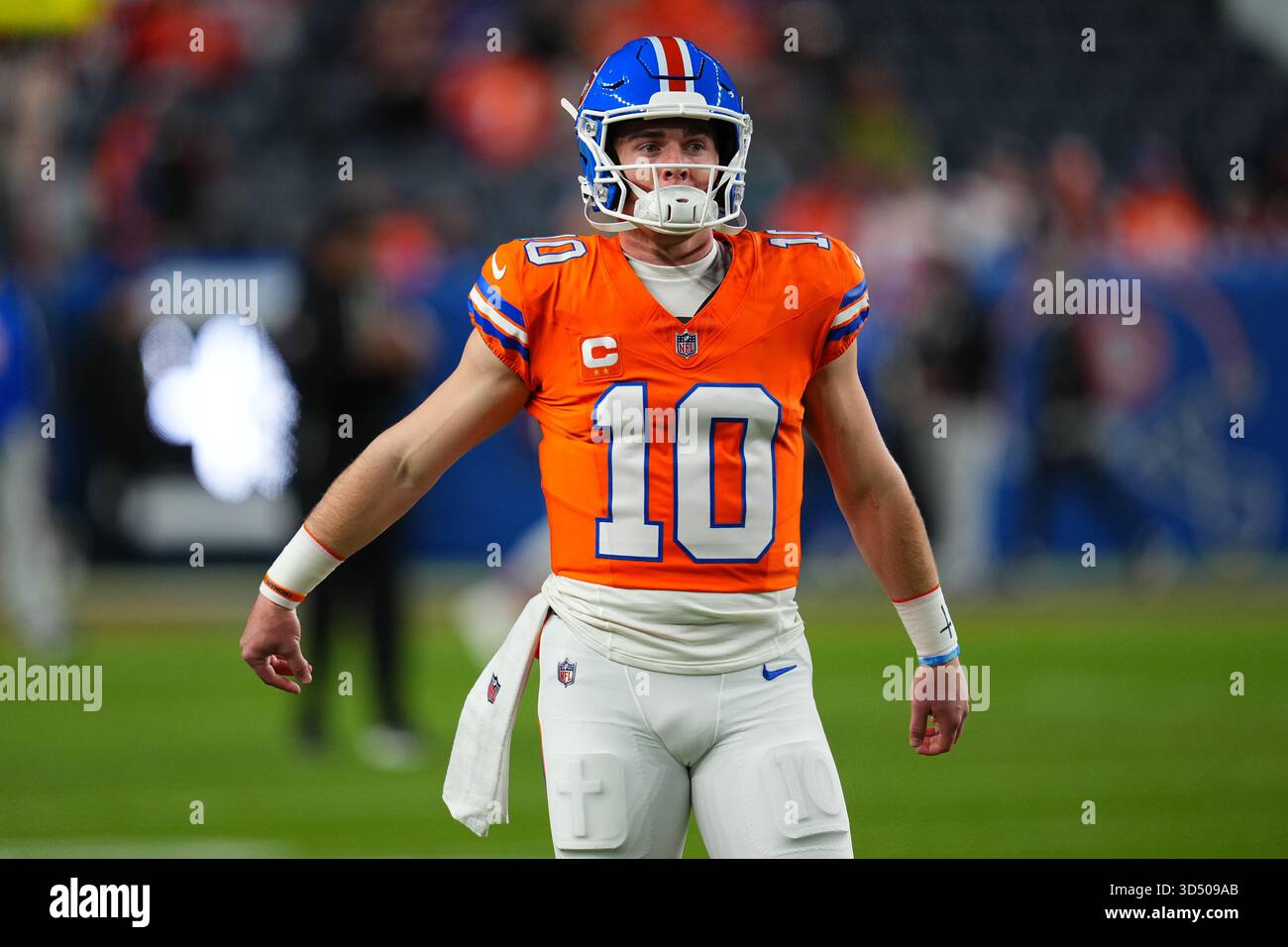 Denver Broncos quarterback Bo Nix warms up against the Las Vegas ...