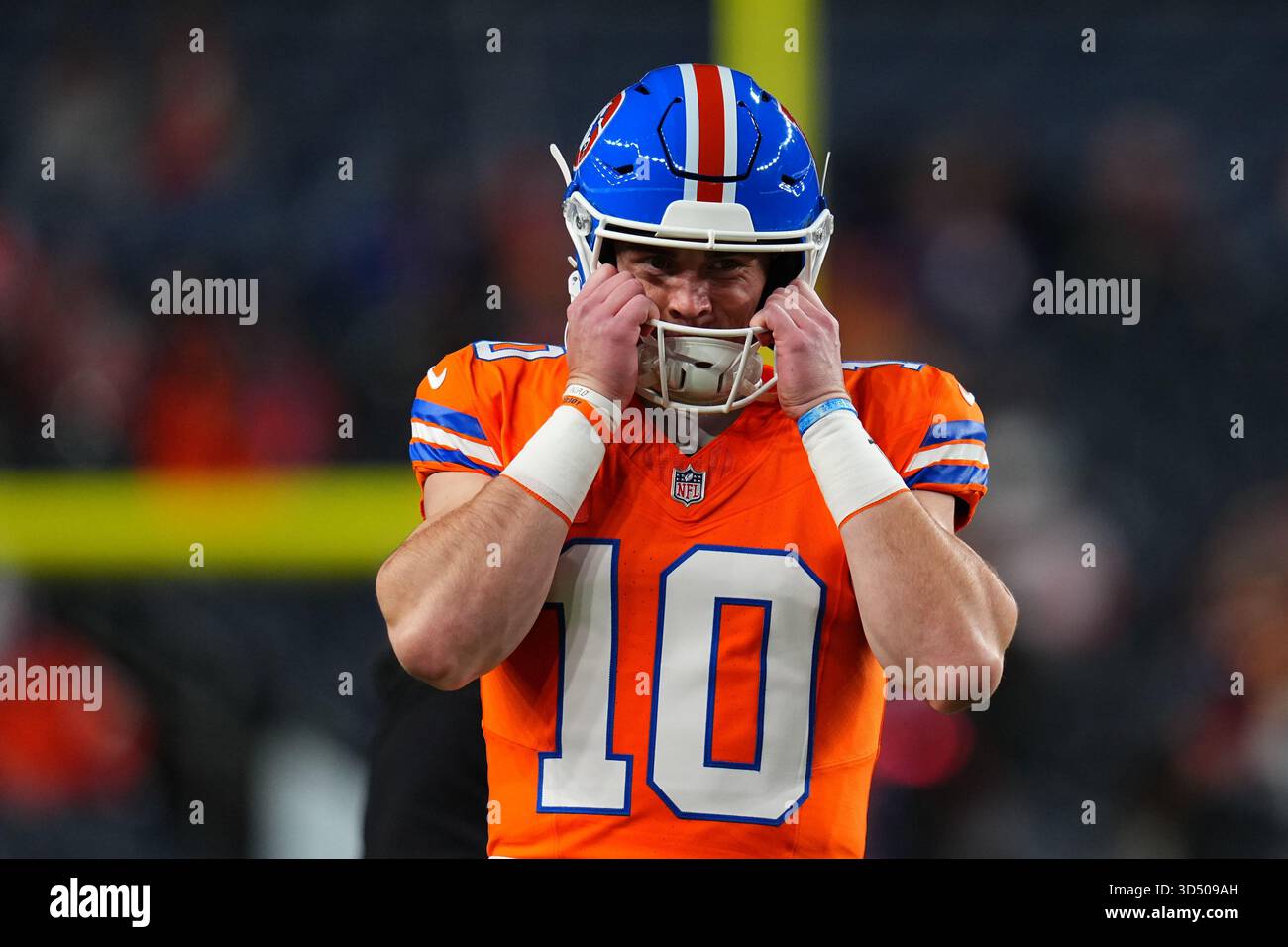 Denver Broncos quarterback Bo Nix warms up against the Las Vegas ...