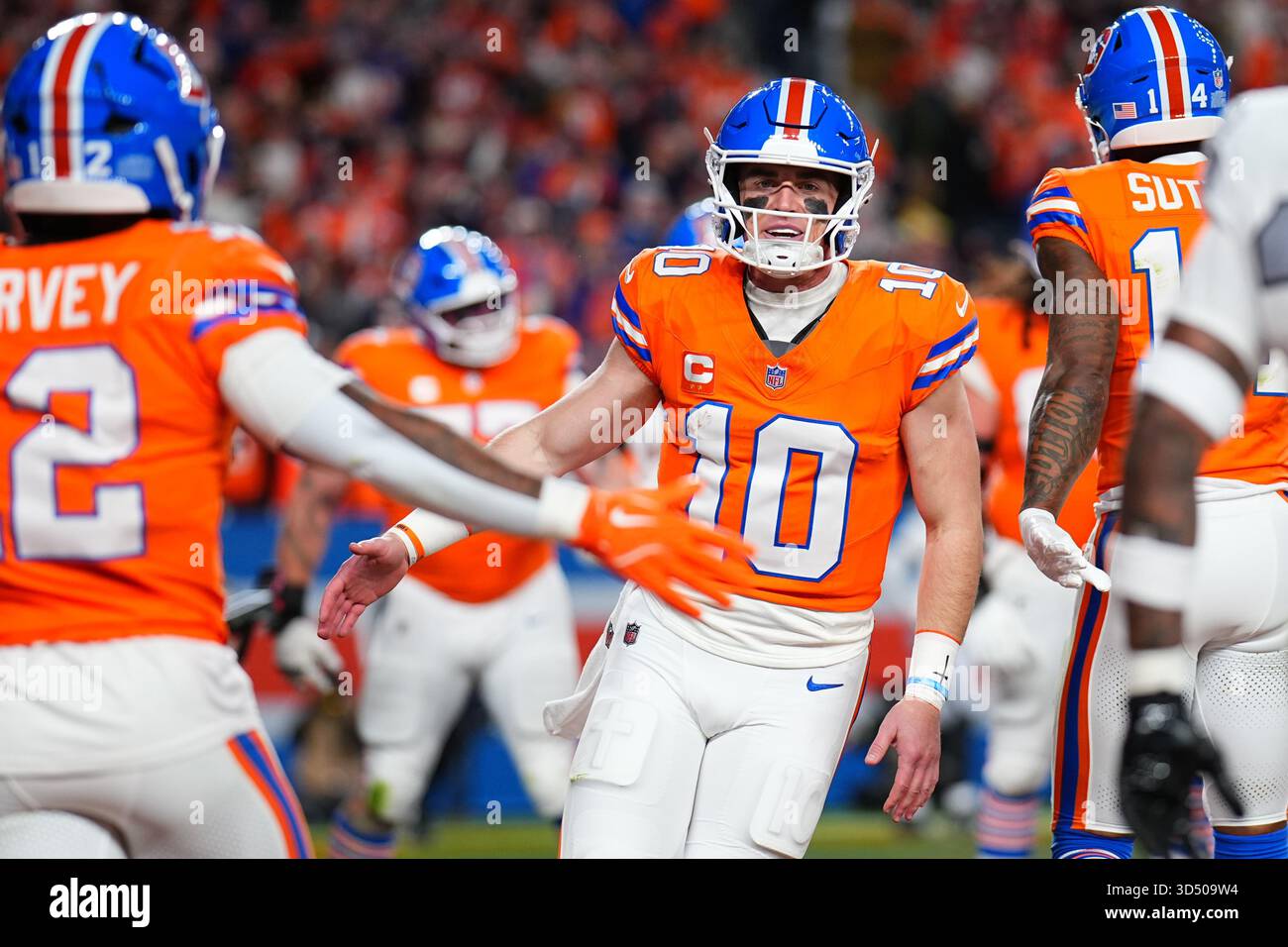 Denver Broncos quarterback Bo Nix celebrates a team touchdown against ...