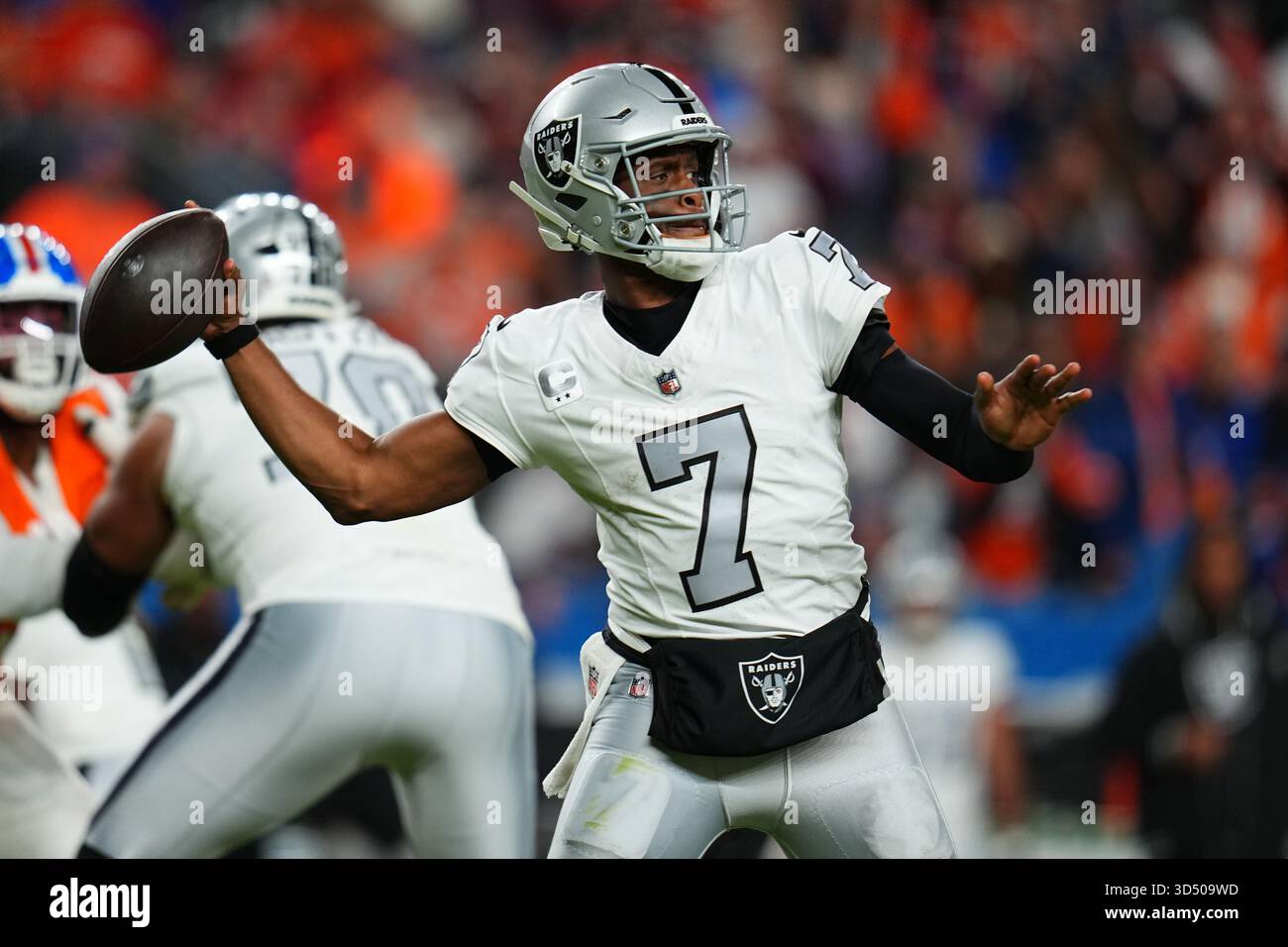 Las Vegas Raiders quarterback Geno Smith passes against the Denver ...