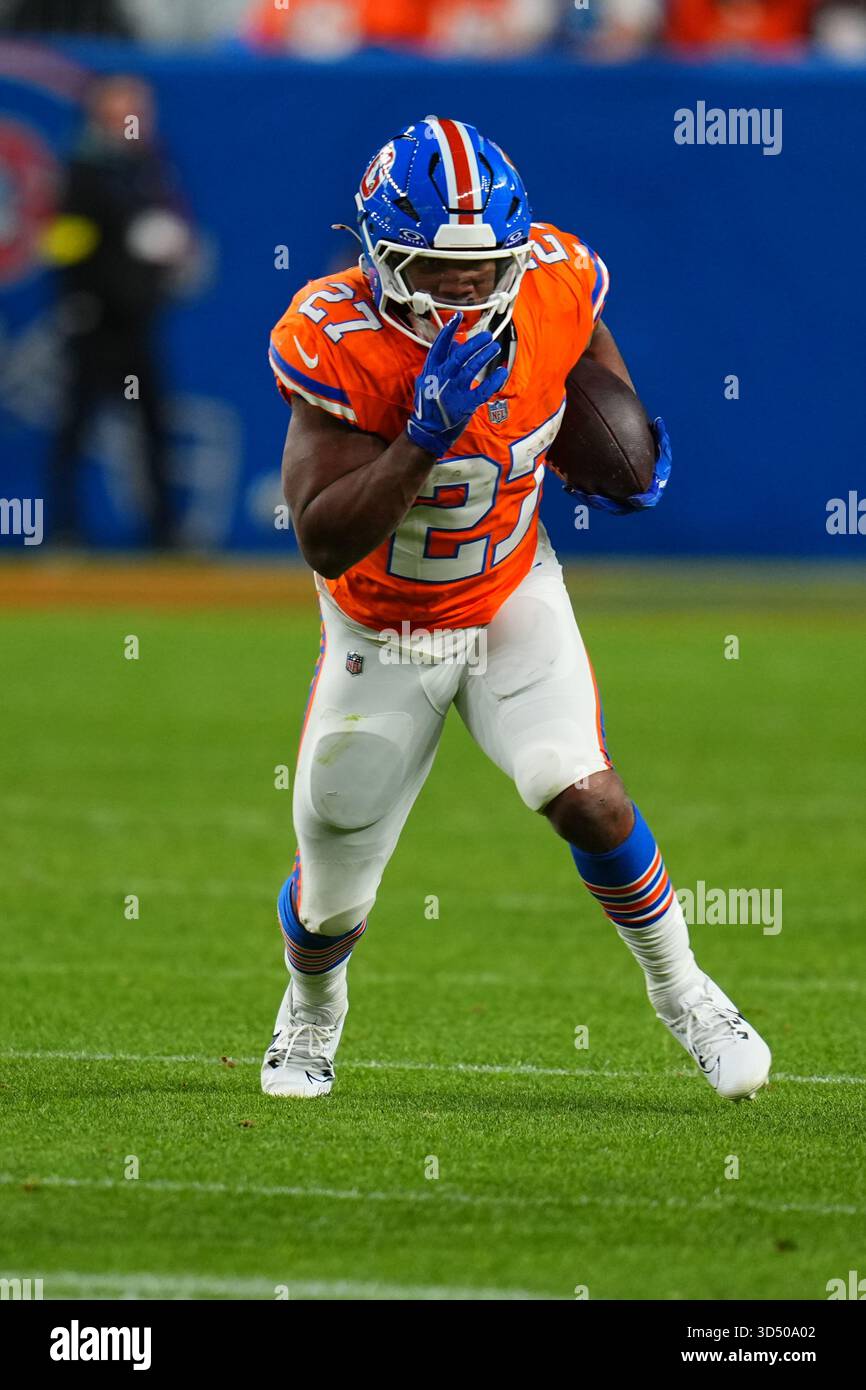 Denver Broncos running back J.K. Dobbins (27) runs against the Las ...