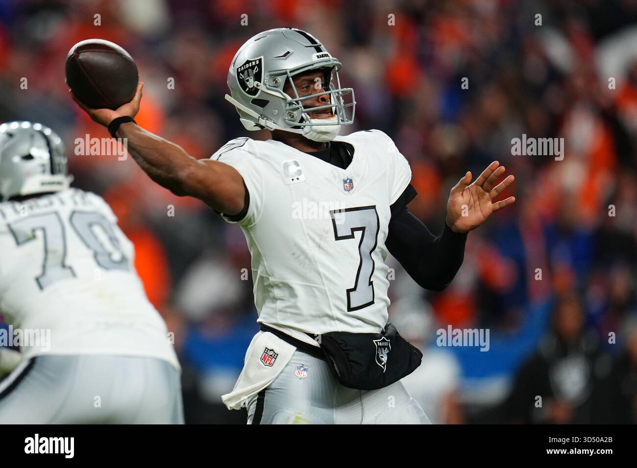 Las Vegas Raiders quarterback Geno Smith passes against the Denver ...