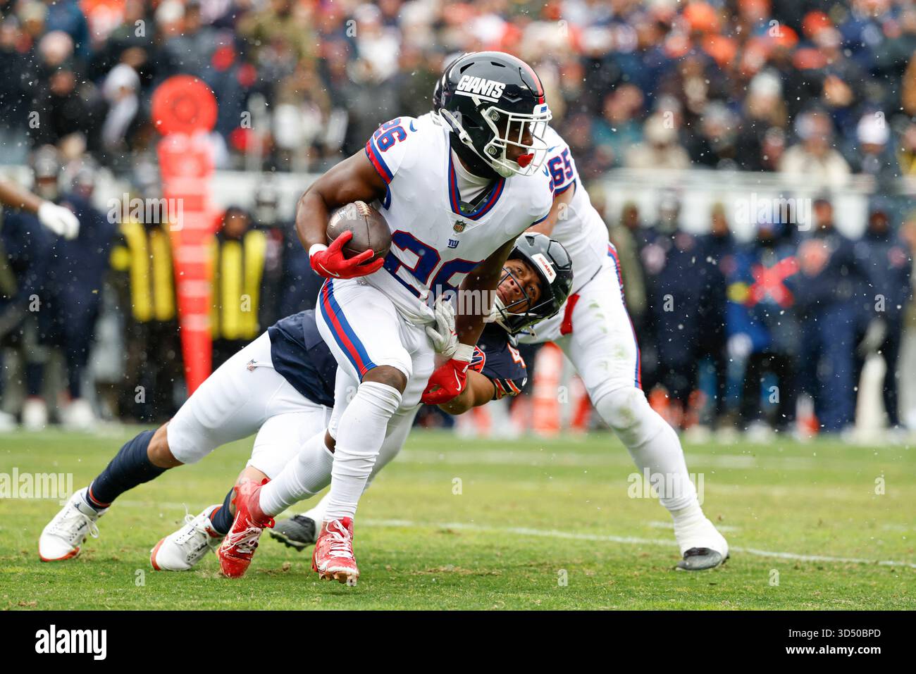 New York Giants running back Devin Singletary (26) runs with the ball ...