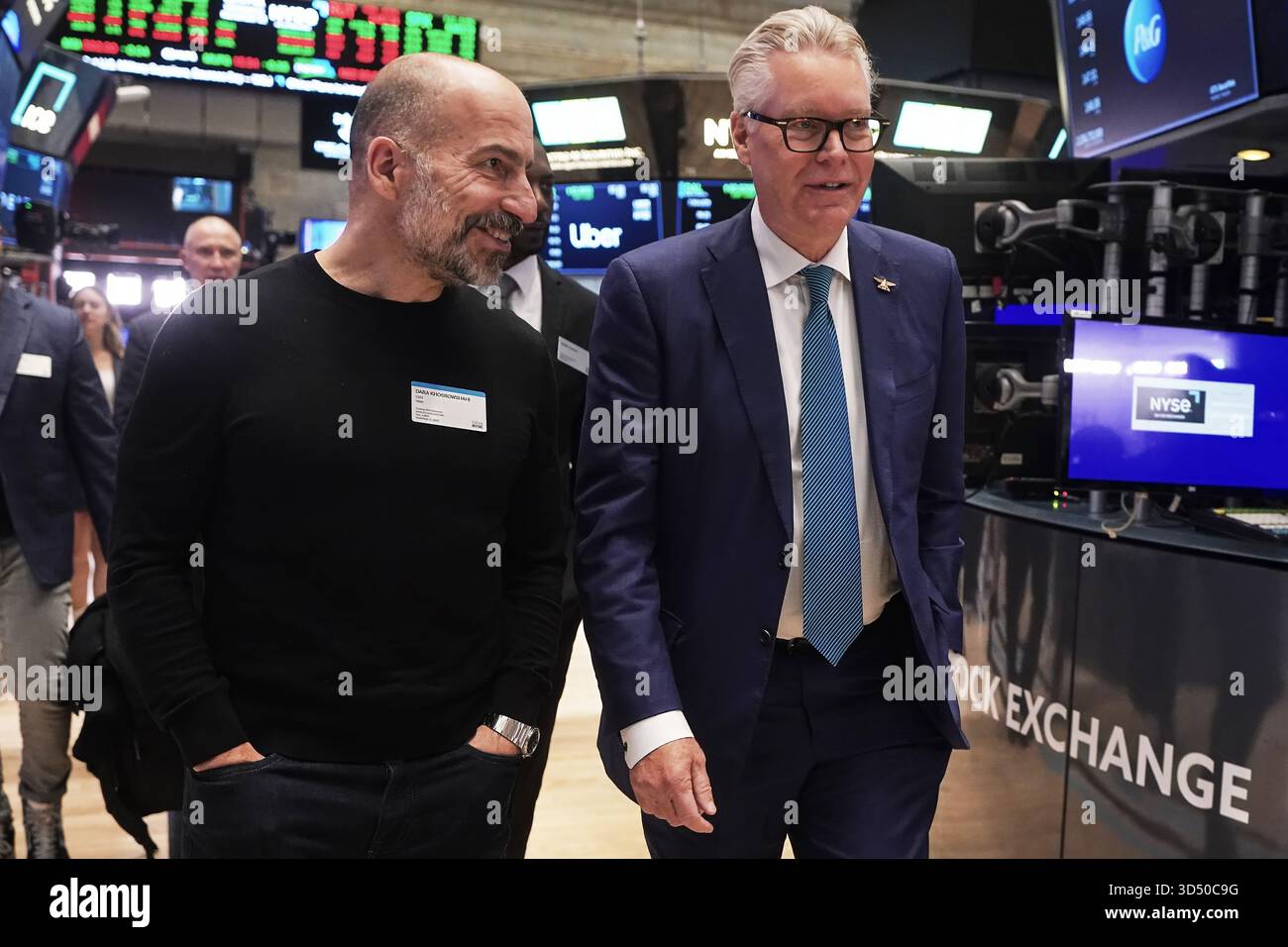 Uber CEO Dara Khosrowshahi, left, and Delta Air Lines CEO Ed Bastian ...