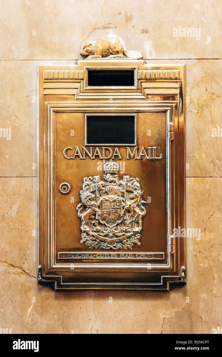 Montreal, Canada - August 11, 2025: Vintage brass Canada Mail chute ...