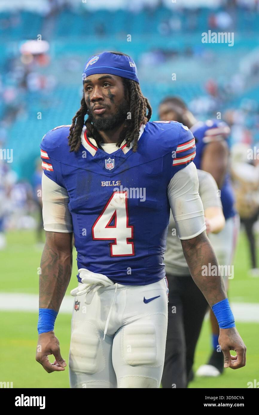Buffalo Bills running back James Cook III (4) walks off the field after ...