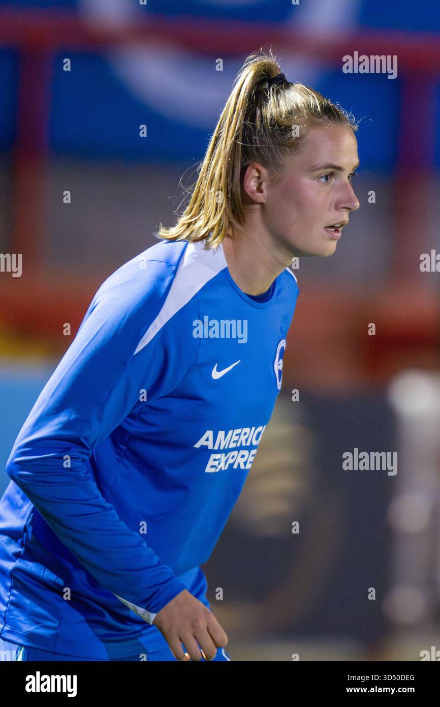 Marit Auee (23 Brighton and Hove Albion) warms up before the match ...