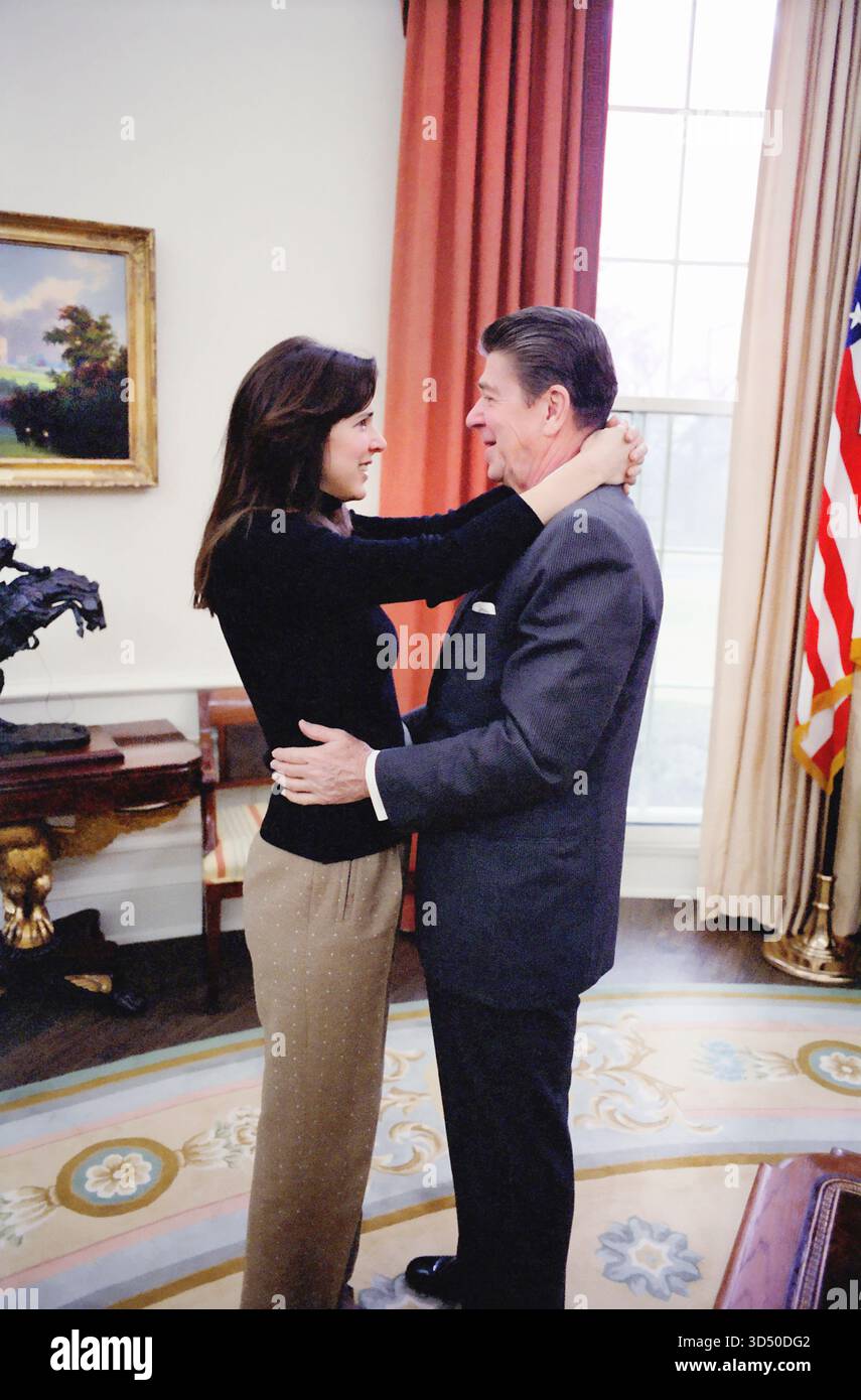 U.S. President Ronald Reagan with his daughter Patti Davis in the Oval ...