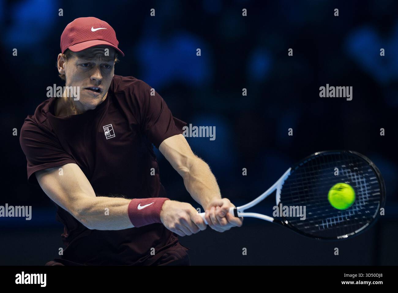 Jannik Sinner of Italy plays a backhand during his round robin singles ...