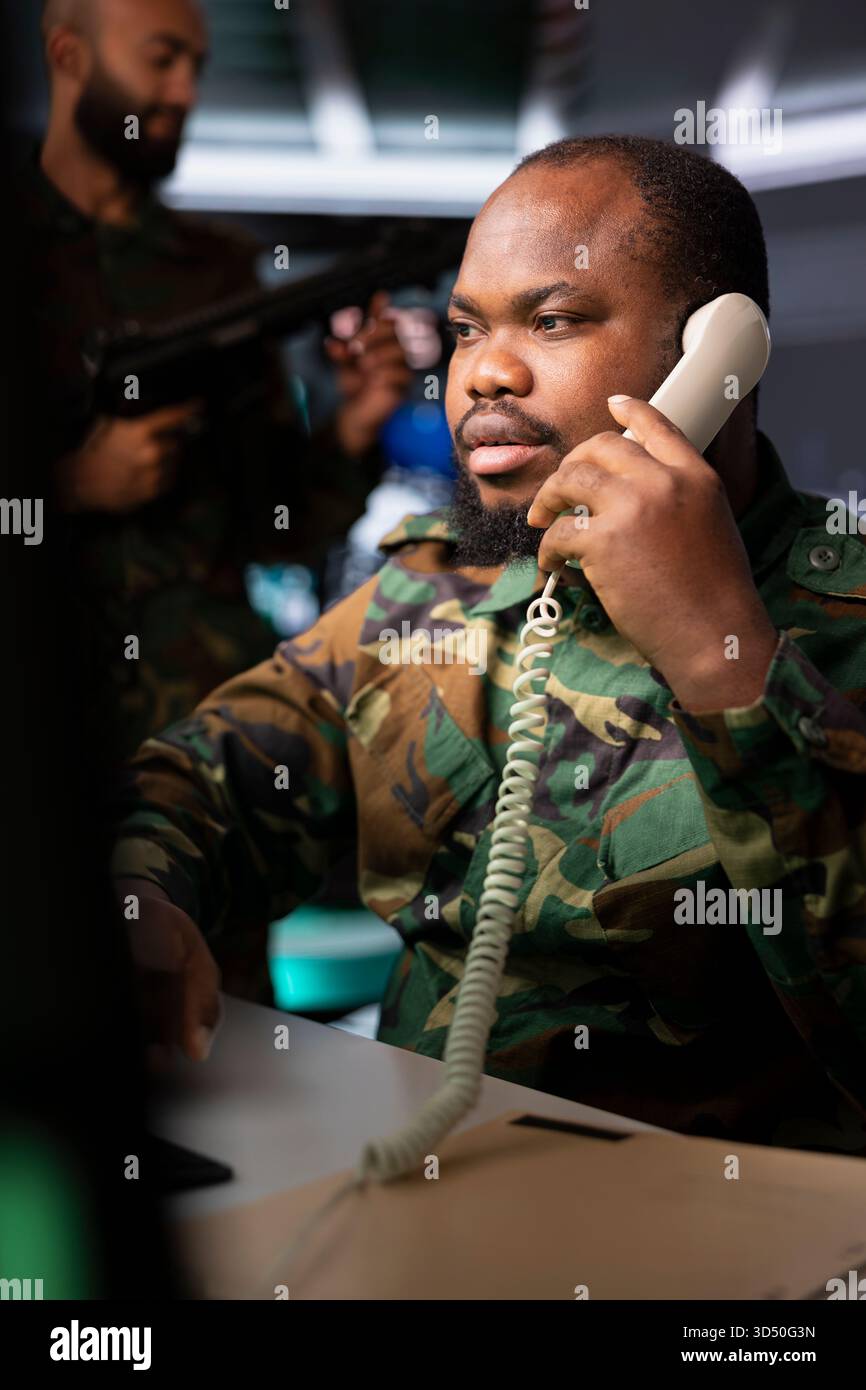 Intelligence agency specialist scanning hi-res stock photography and ...