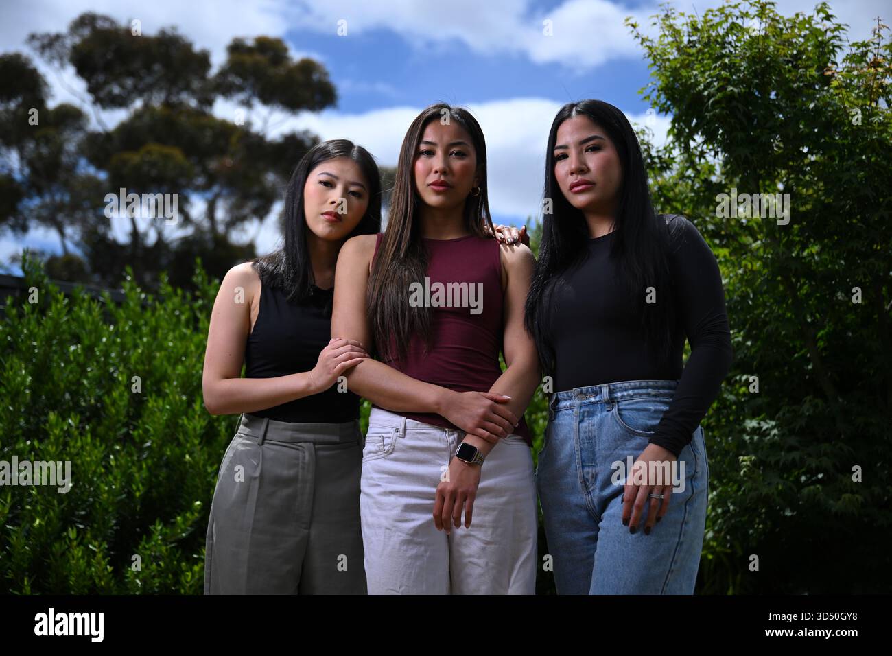 (L-R) Jasmine Tran, Vy Tran and Jenny Bui pose for a photograph in ...
