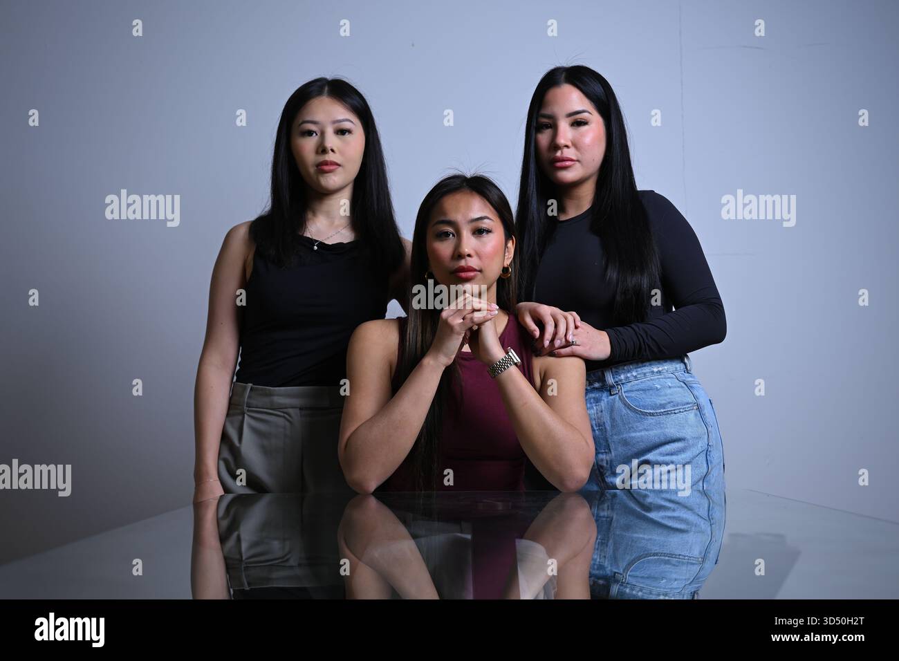 (L-R) Jasmine Tran, Vy Tran and Jenny Bui pose for a photograph in ...