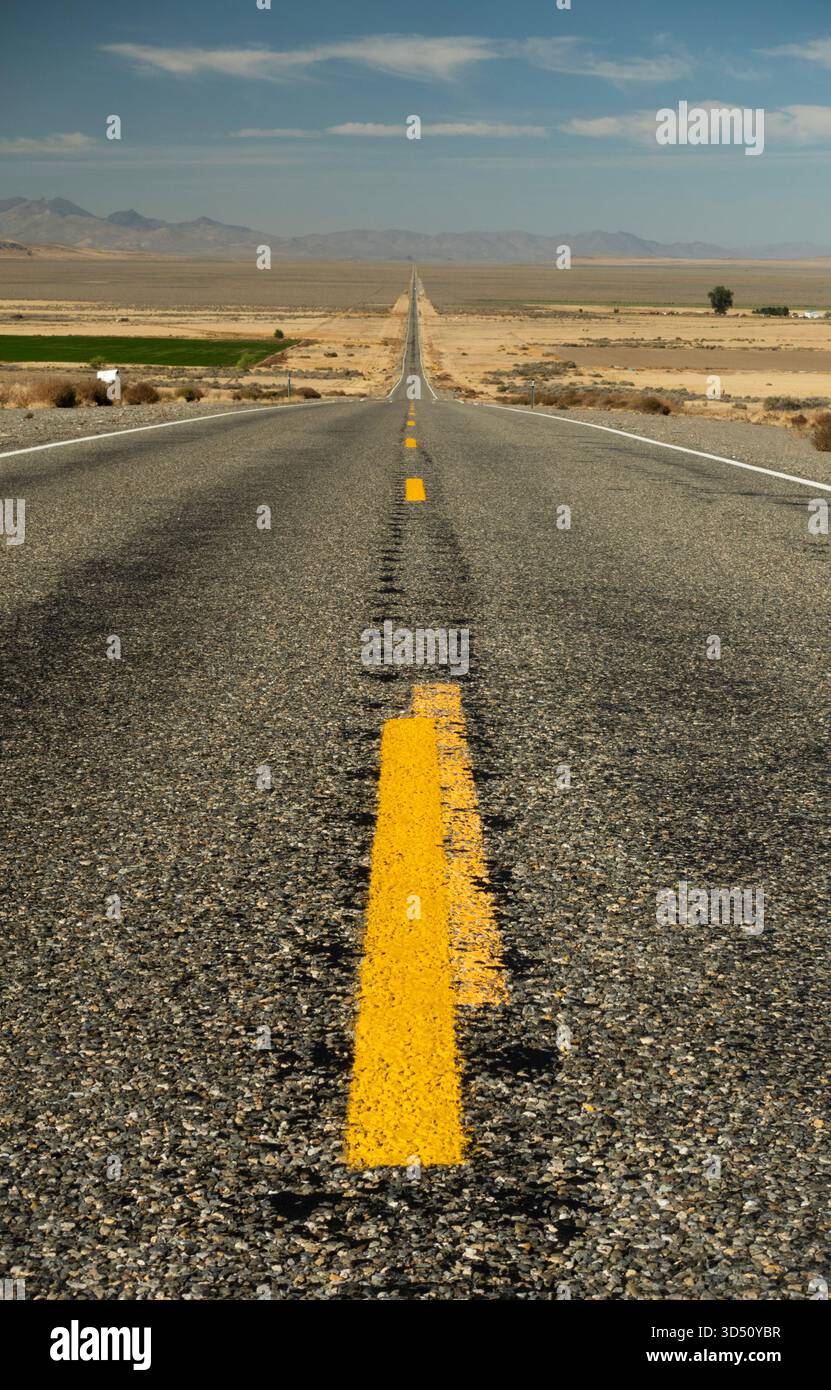 Vertical view of a straight section of asphalt Nevada highway 140 ...