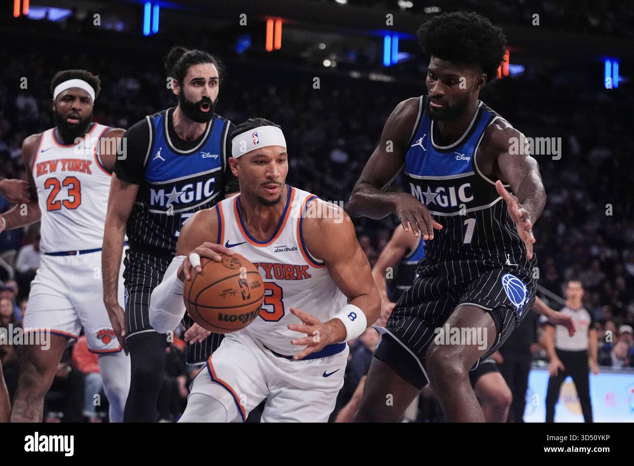 Orlando Magic's Jonathan Isaac (1) and Orlando Magic's Goga Bitadze (35 ...