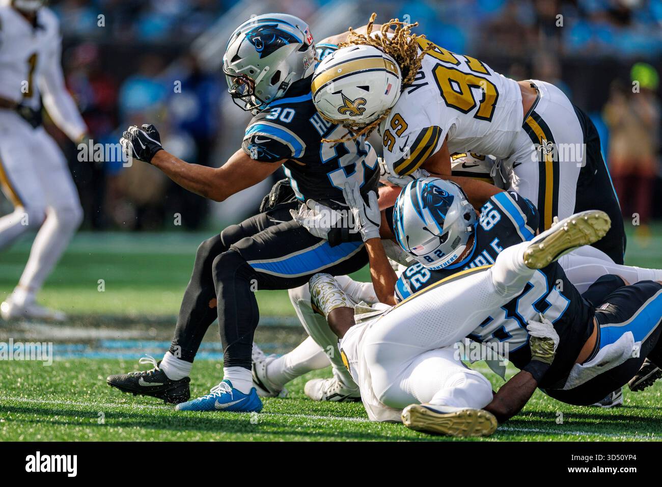 Carolina Panthers running back Chuba Hubbard (30) is tackled by New ...