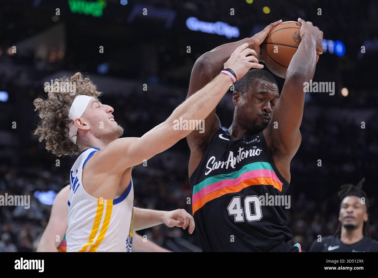 San Antonio Spurs forward Harrison Barnes (40) grabs a rebound over ...