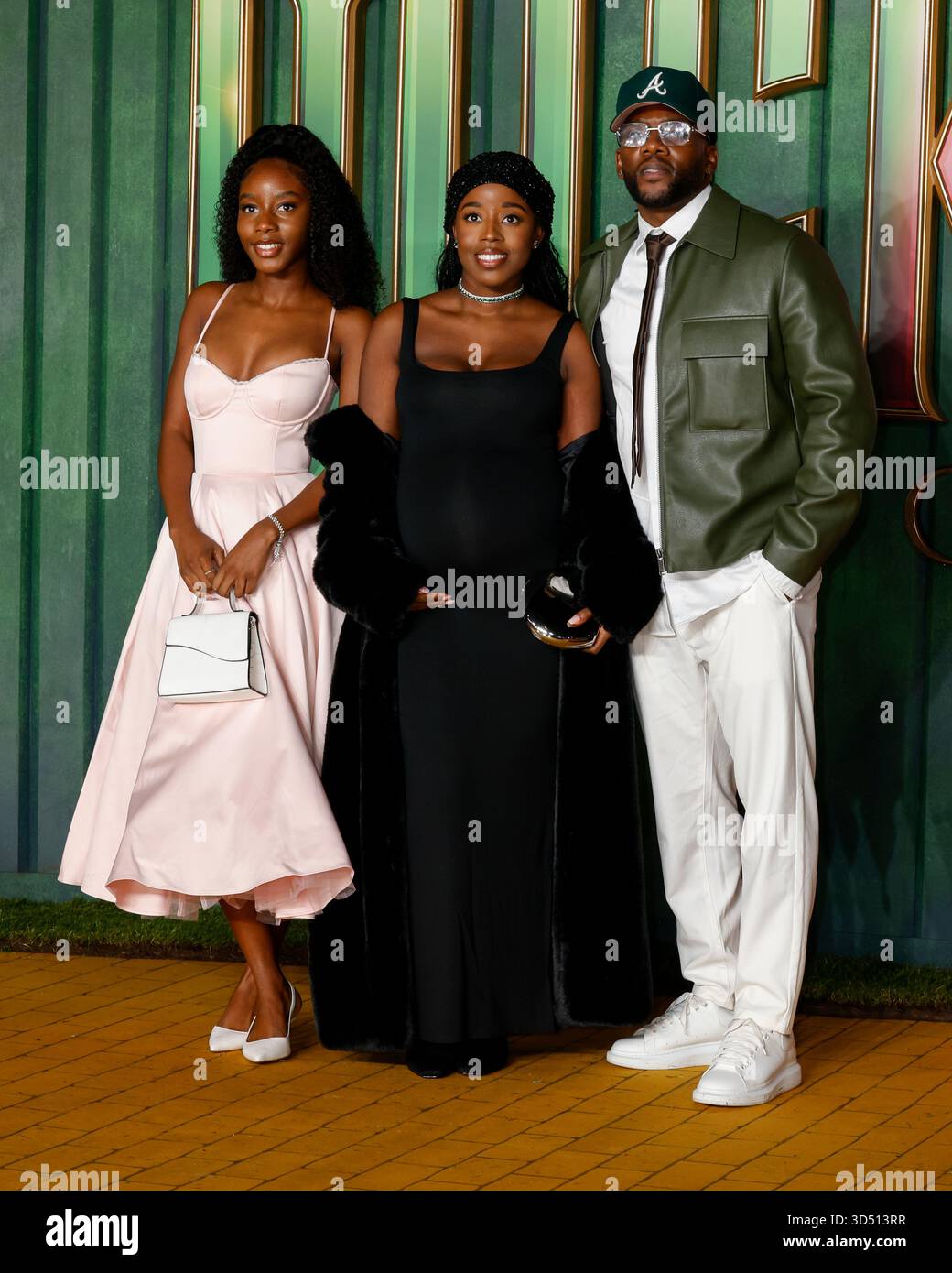 Tay Kabs, Chan Kabs and Teija Kabs of The Kabs Family attend the Wicked ...