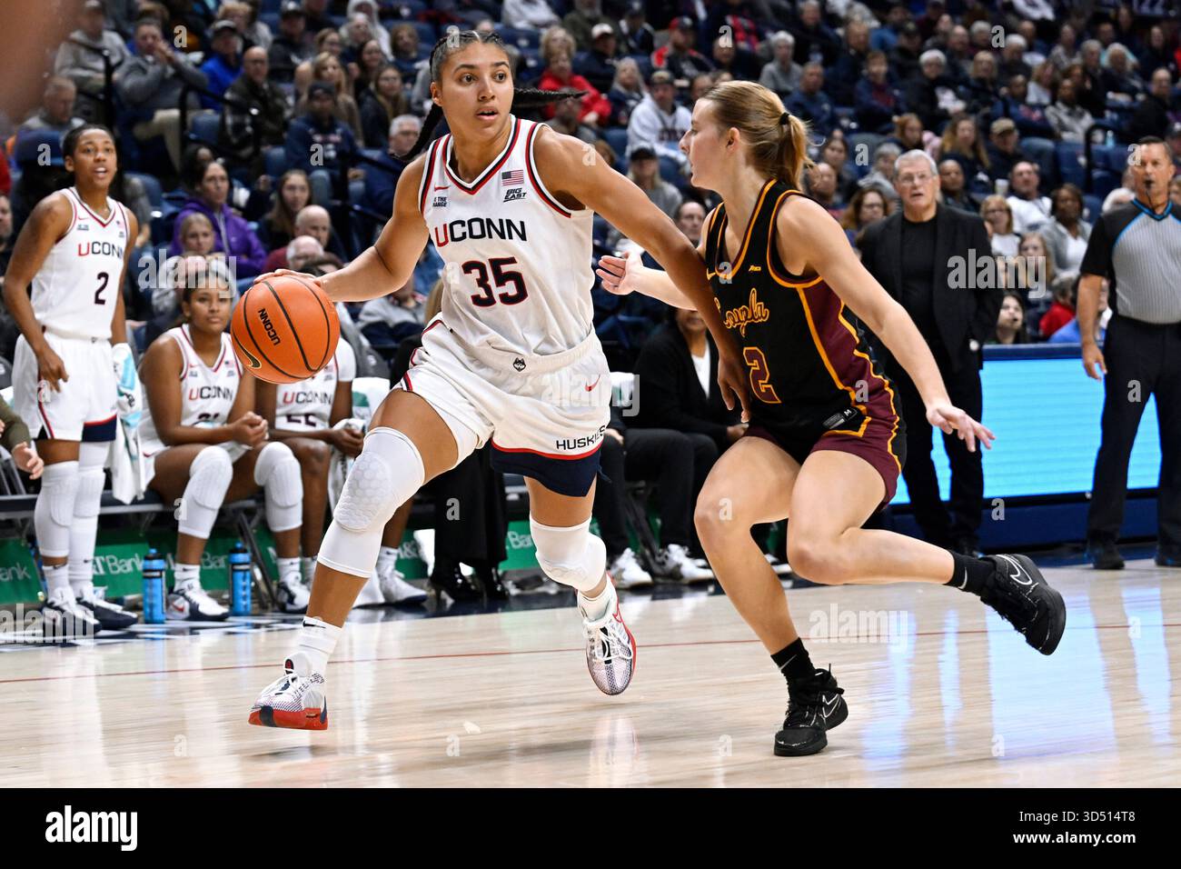 UConn guard Azzi Fudd (35) is guarded by Loyola Chicago guard Alexa ...