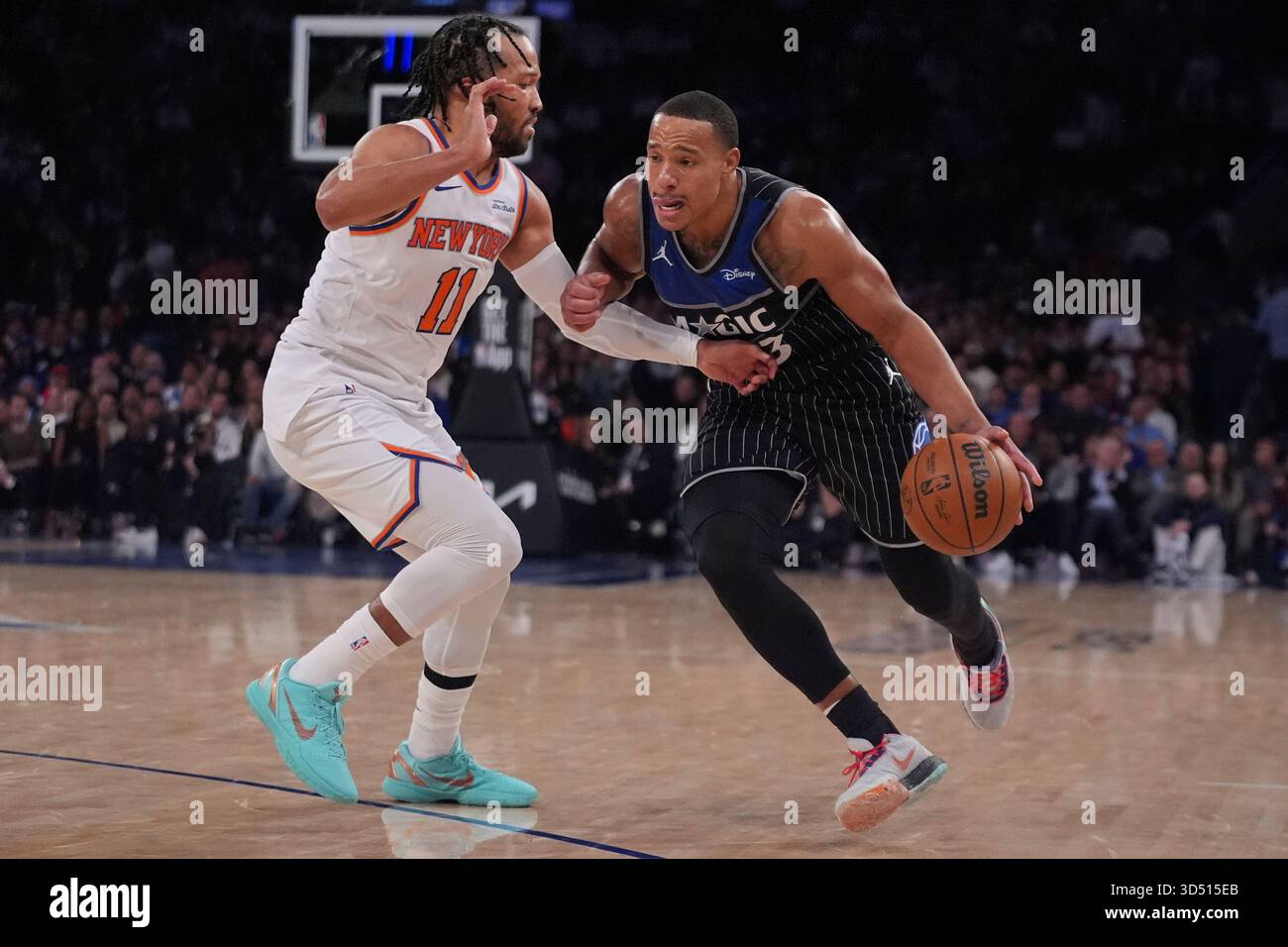 New York Knicks' Jalen Brunson (11) defends Orlando Magic's Desmond ...