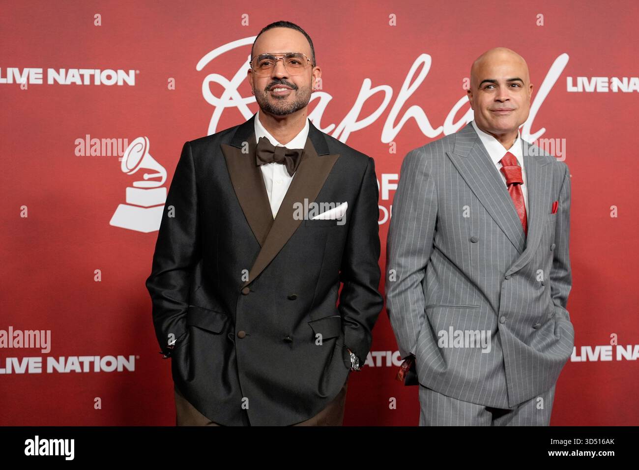 Jean Rodriguez, left, and Danny Flores, of COASTCITY, arrive at the 26th Latin Grammys Person of ...