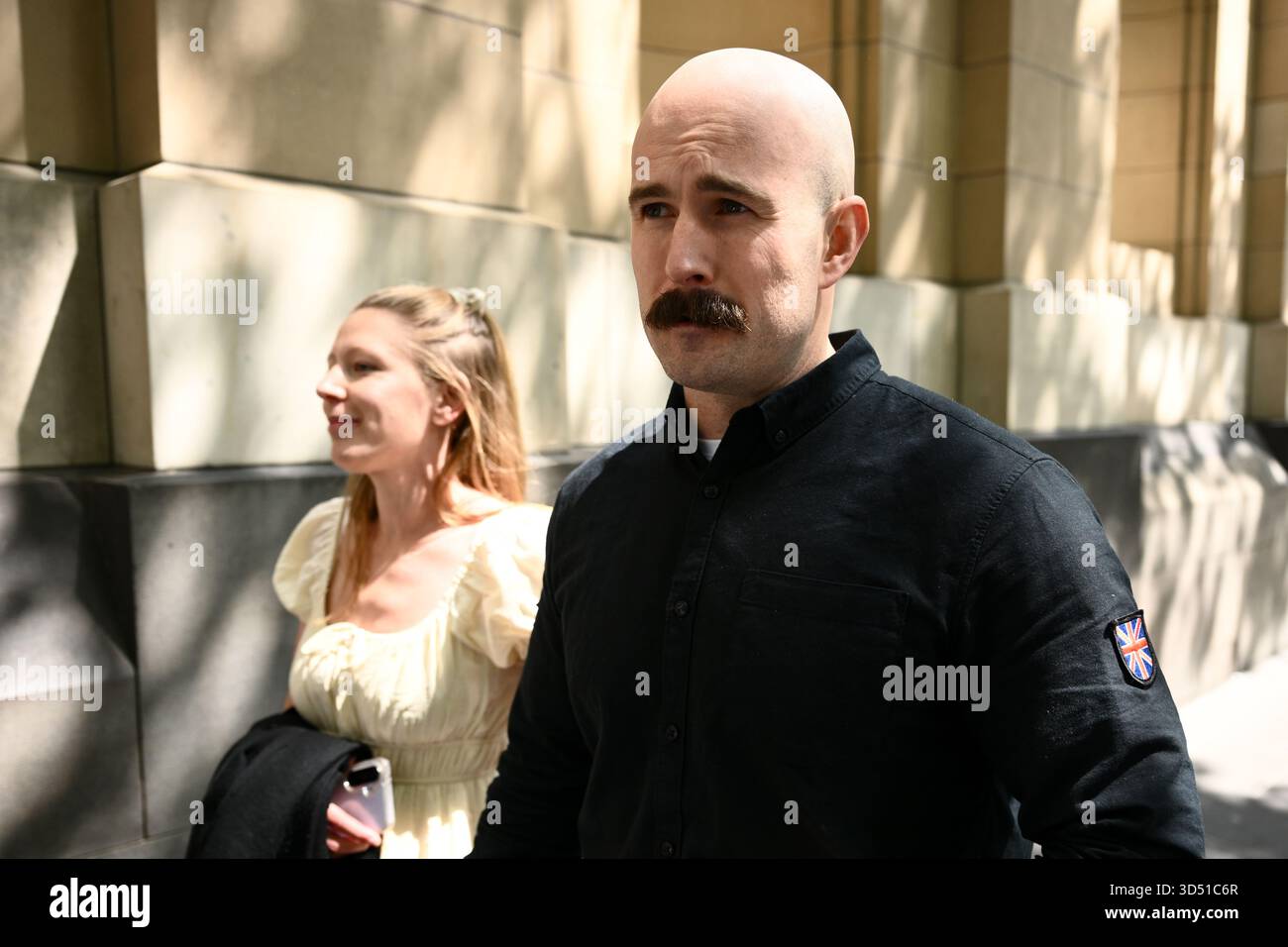 Neo-Nazi Thomas Sewell (right) departs from the Supreme Court of ...
