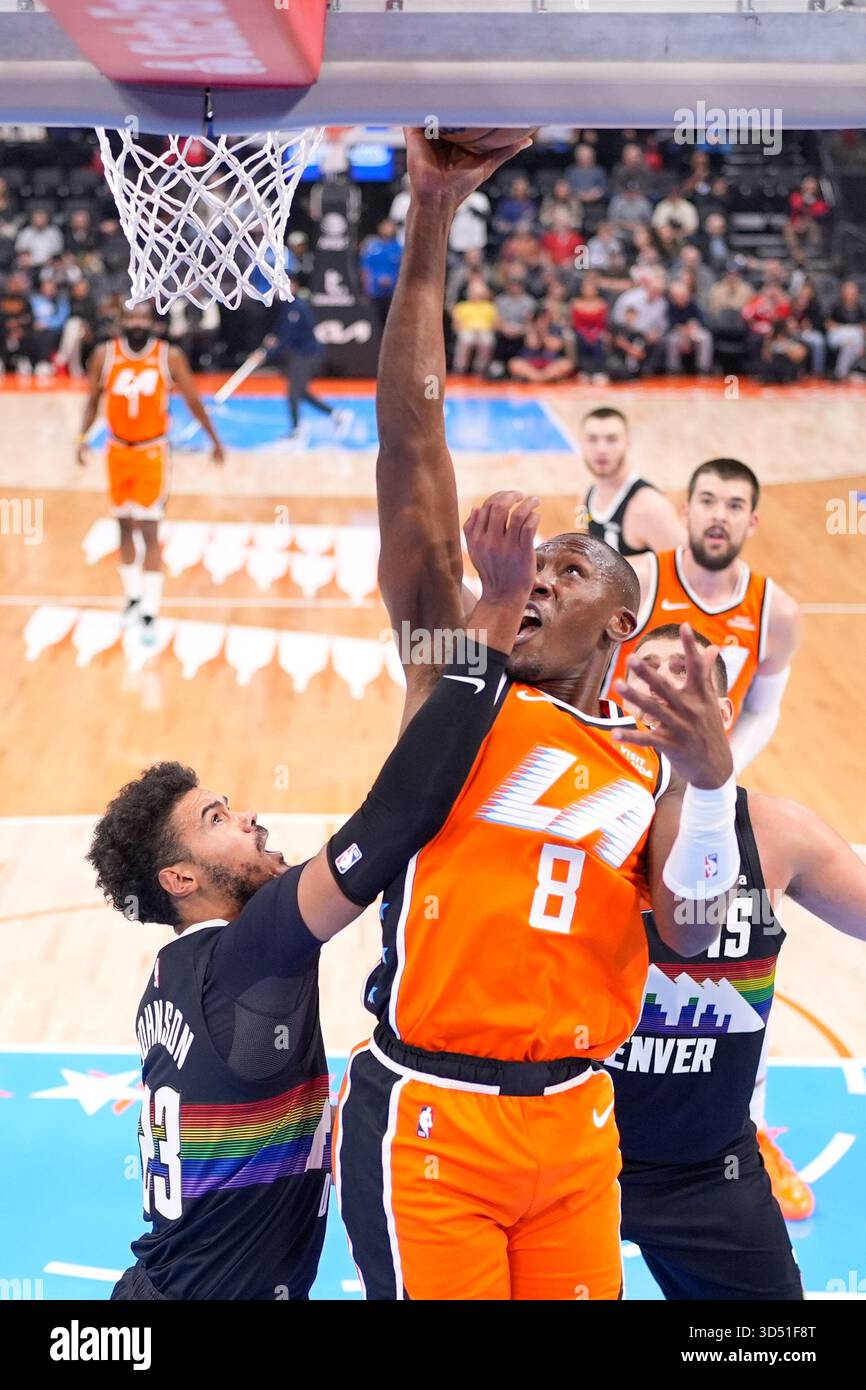 Los Angeles Clippers guard Kris Dunn (8) shoots as Denver Nuggets ...