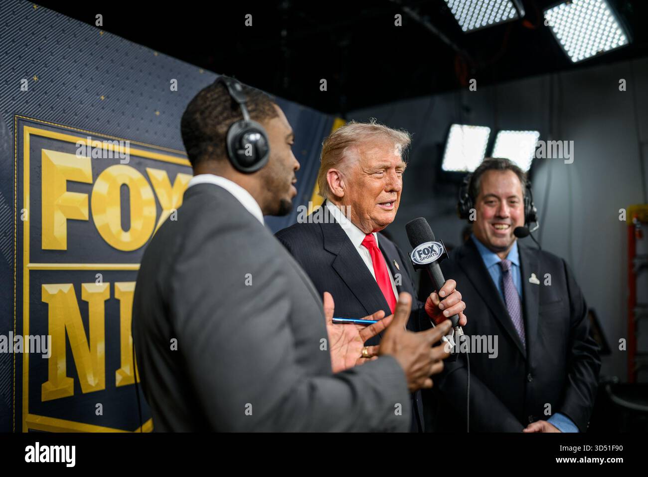 President Donald Trump calls the game alongside Kenny Albert and ...