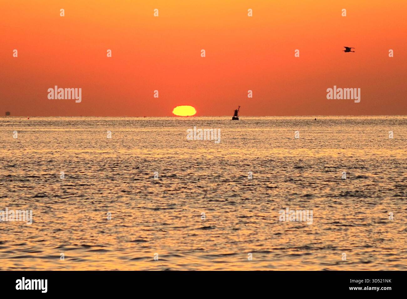 Sunrise scenery on the coast of the Yellow Sea in Qingdao City, east ...