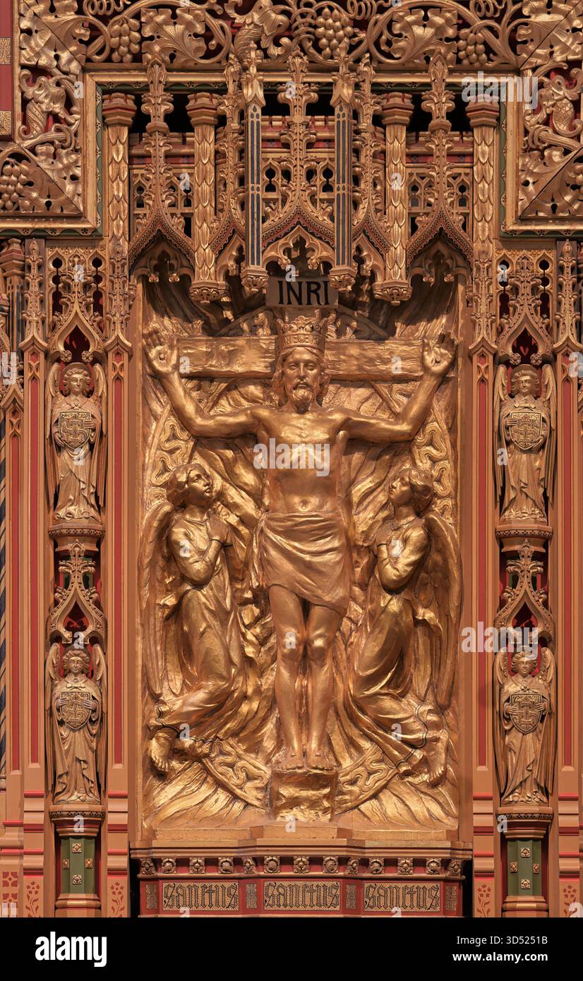 Gilded reredos behind the altar in the Chapel of St Michael at the ...